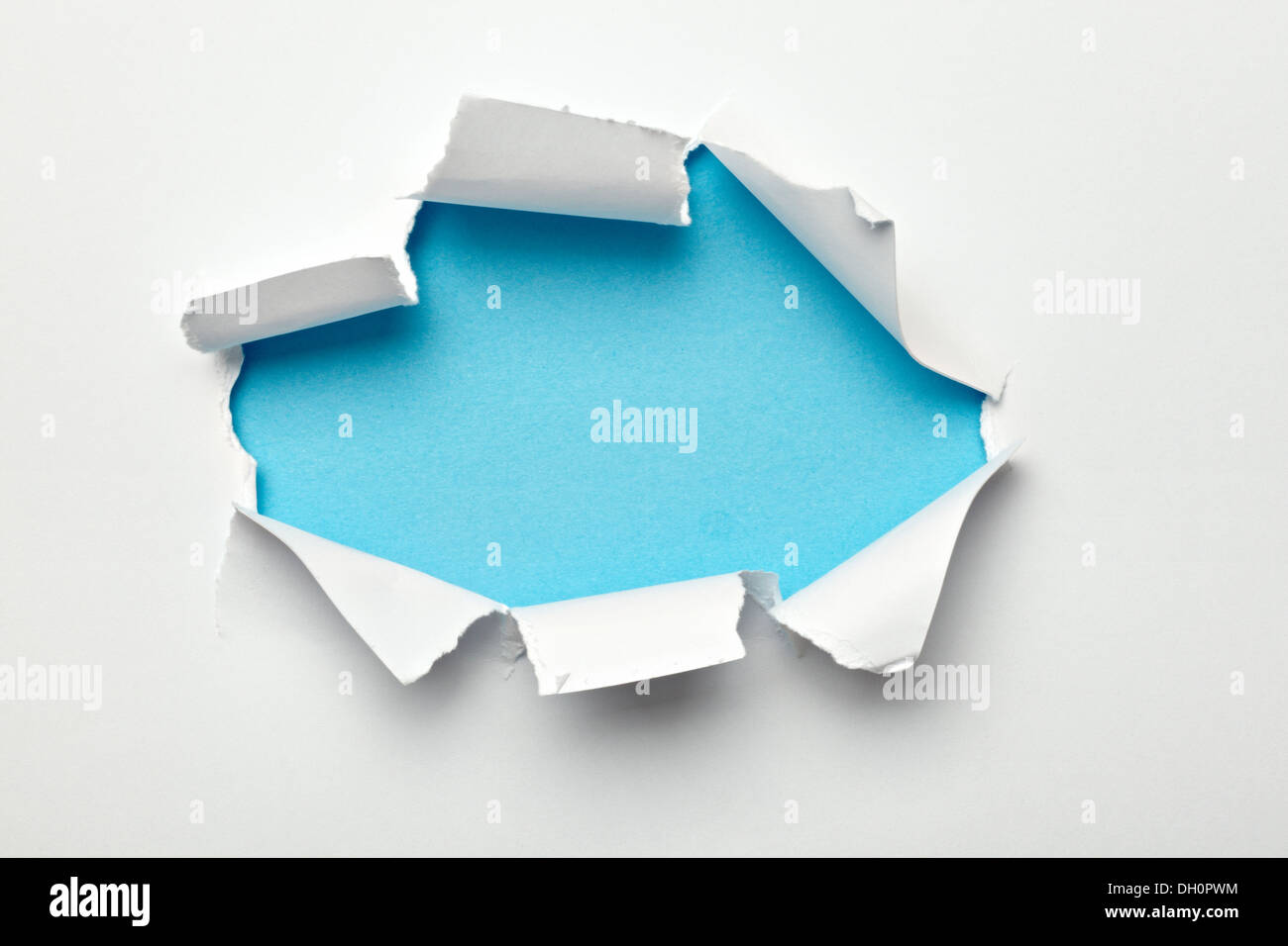 paper hole ripped Stock Photo - Alamy