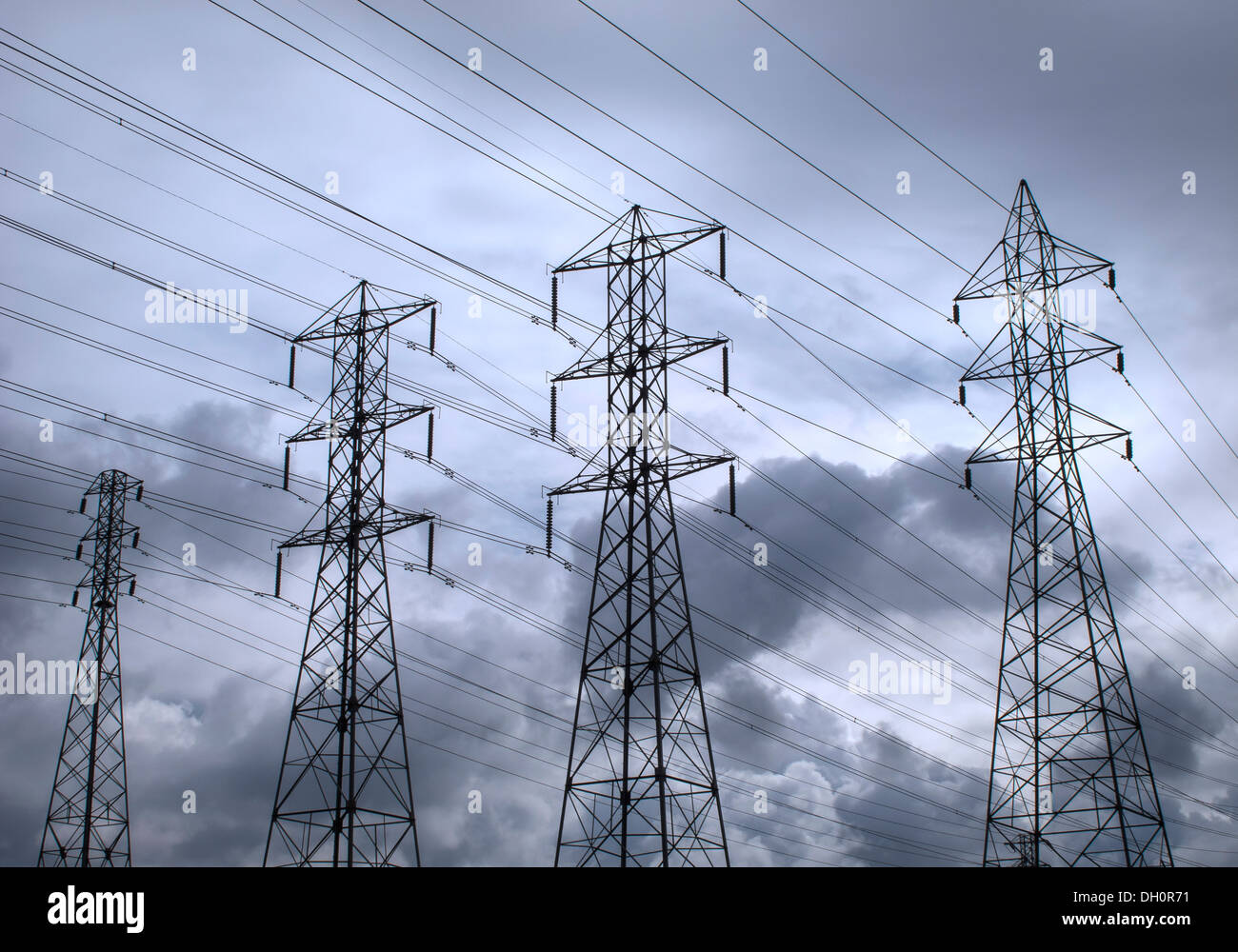 Power lines backed by a stormy sky Stock Photo - Alamy