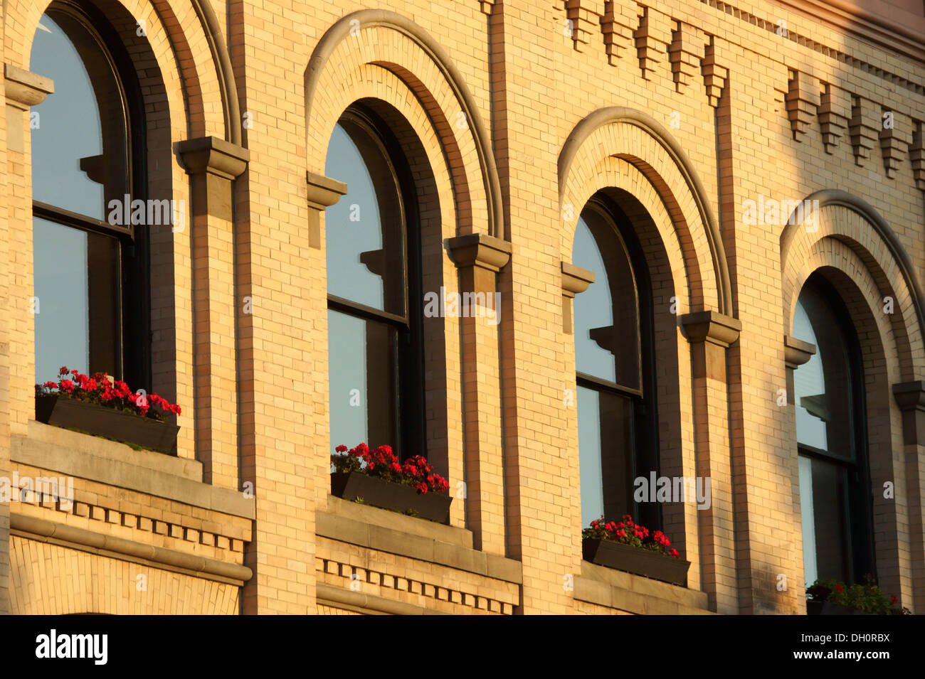 Geraniums on a windowsill of an old bank building in the Fairhaven ...