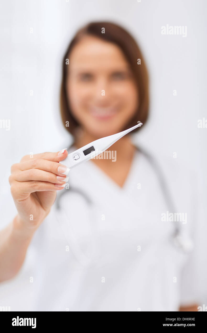 doctor with thermometer and stethoscope Stock Photo - Alamy
