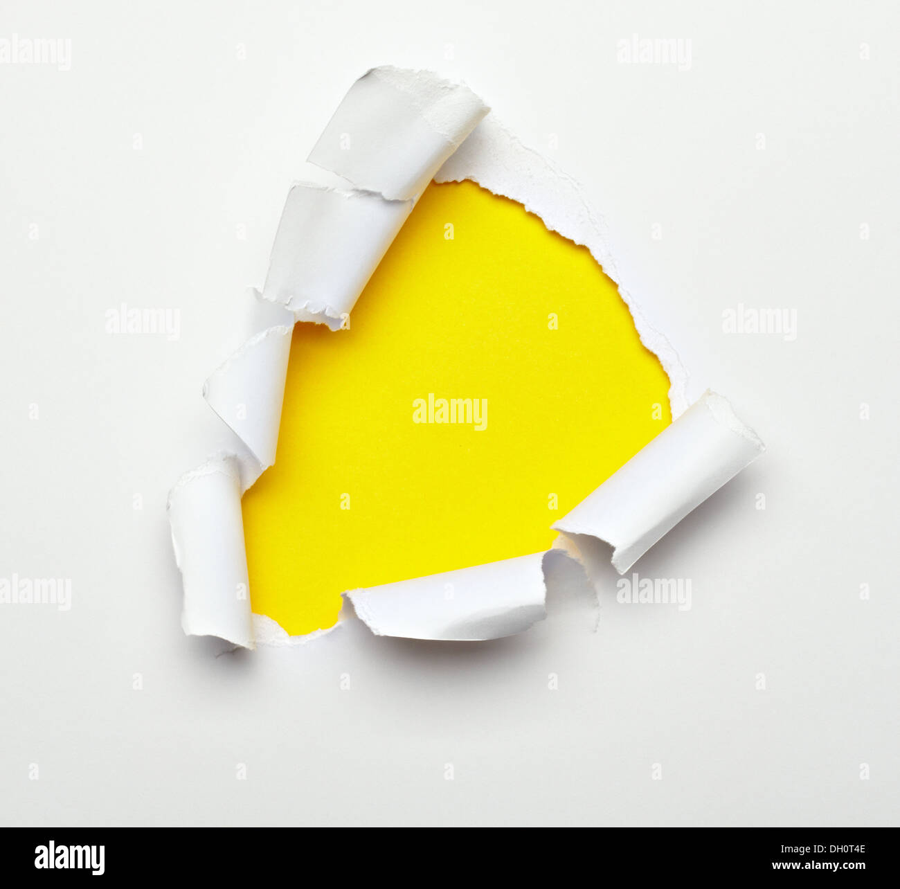 paper hole ripped Stock Photo - Alamy