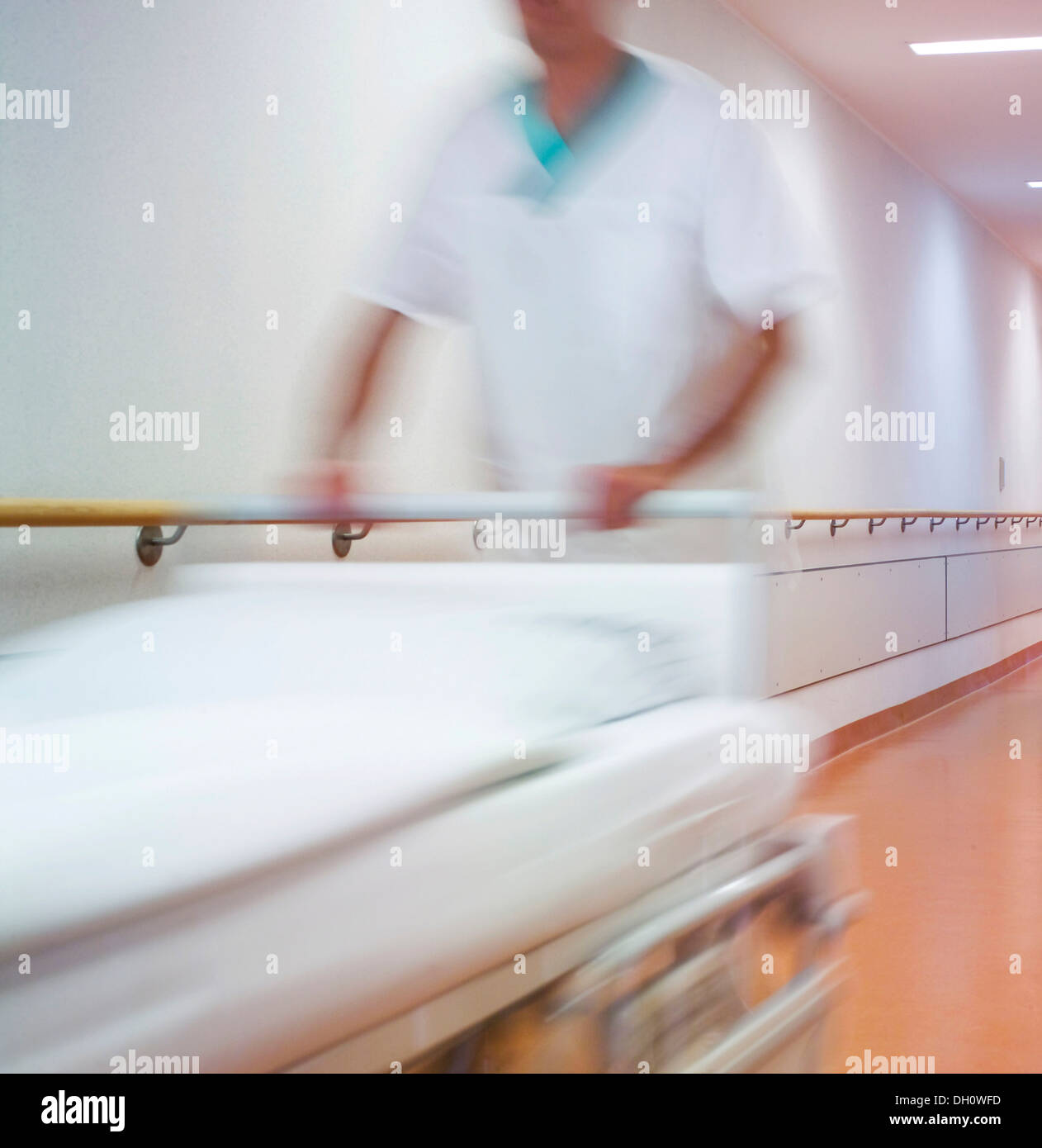 Nurse pushing a bed Stock Photo - Alamy