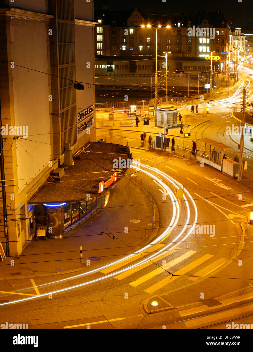 Evening on the busy Central square with the building of the Polybahn ...