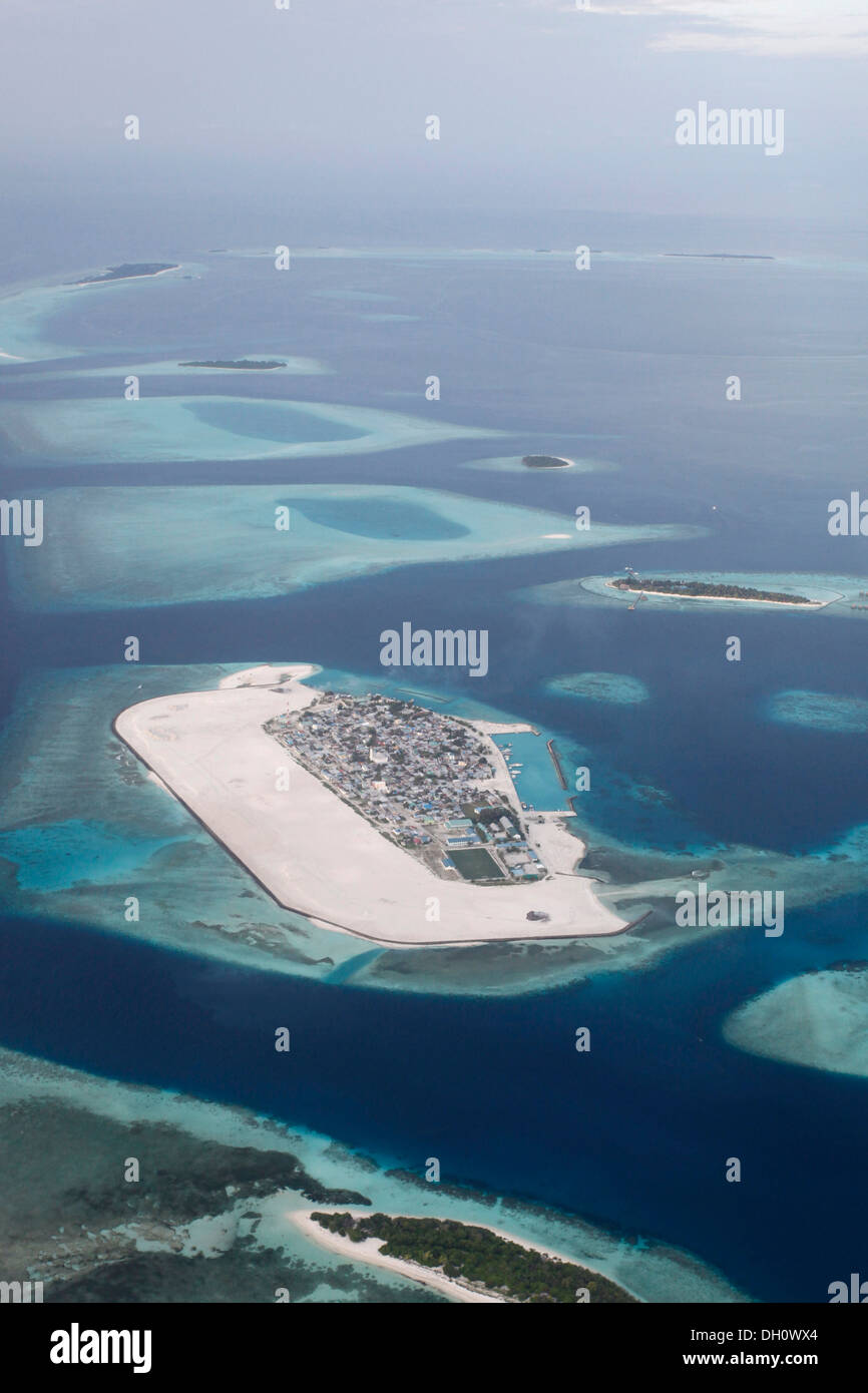 Aerial view, atolls of the Maldives on the flight from Male to the ...