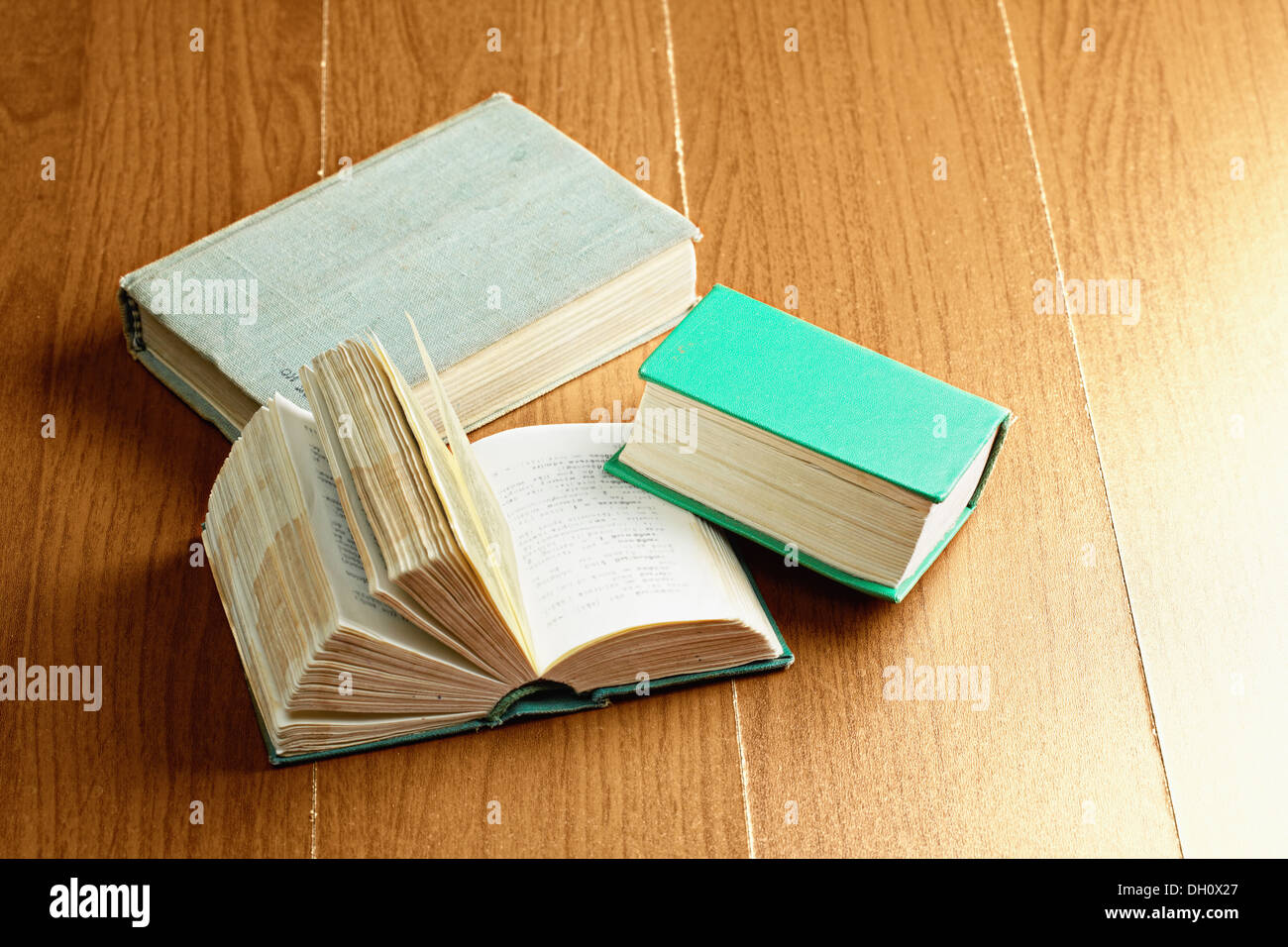Three old books Stock Photo - Alamy