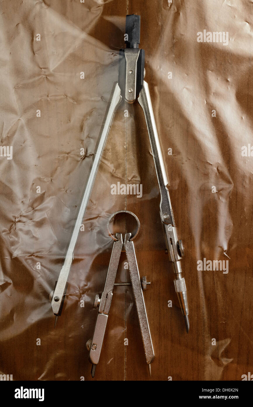 Two compasses in plastic bag Stock Photo - Alamy