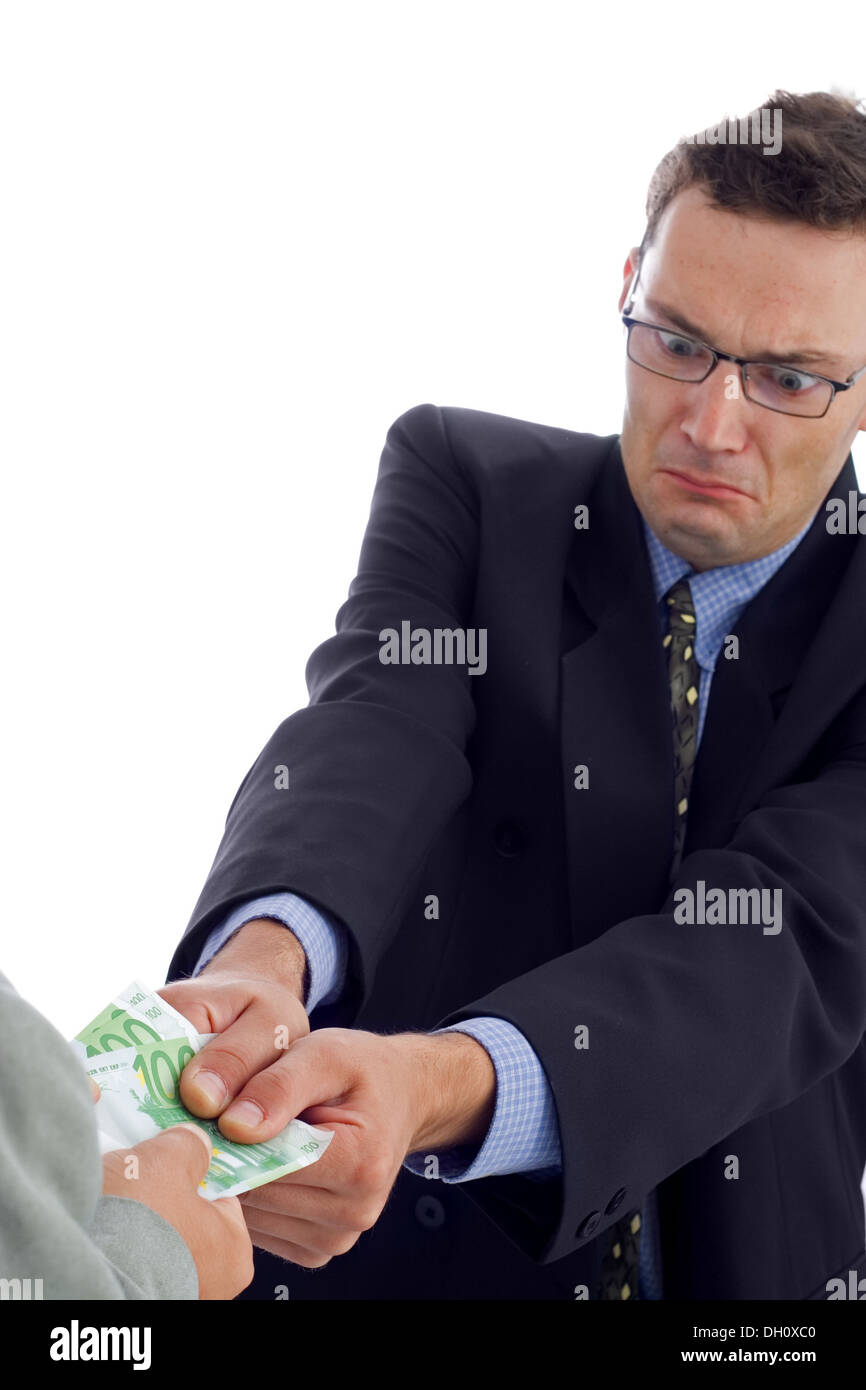 Angry businessman struggling to take the money Stock Photo - Alamy