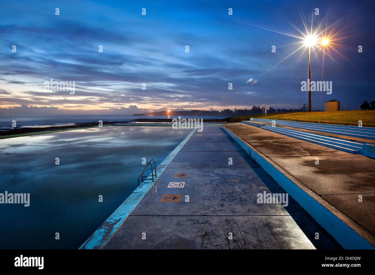 Coastal pool at sunrise Stock Photo - Alamy