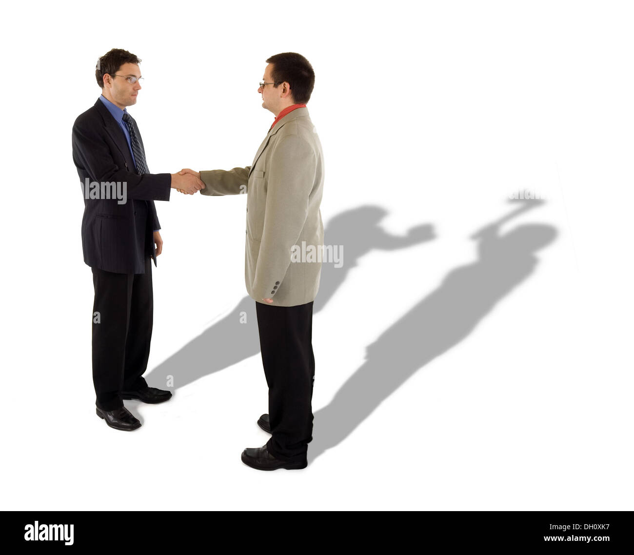 Business handshake and the real truth behind Stock Photo - Alamy