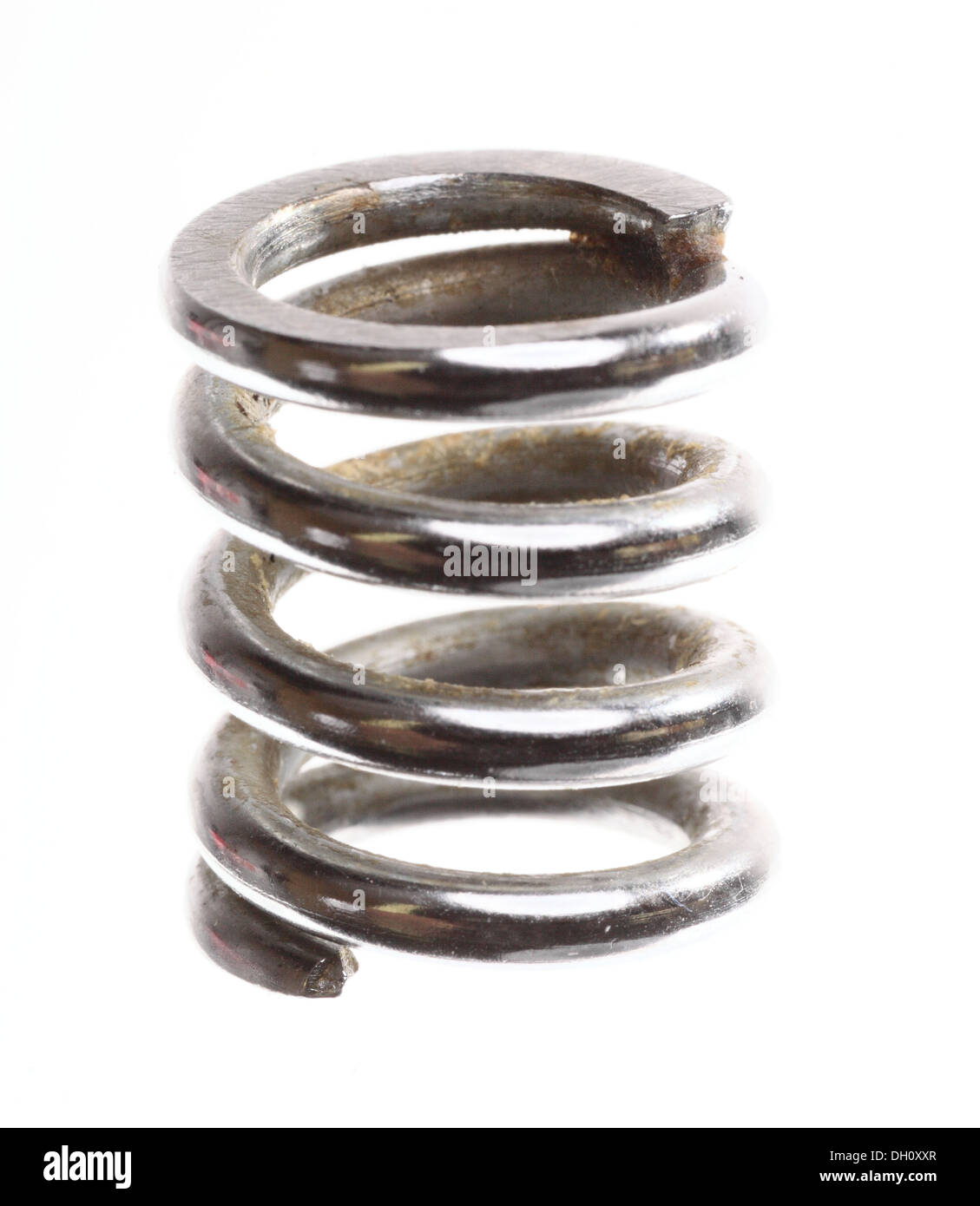 Metal steel industrial coil spring isolated on white Stock Photo - Alamy