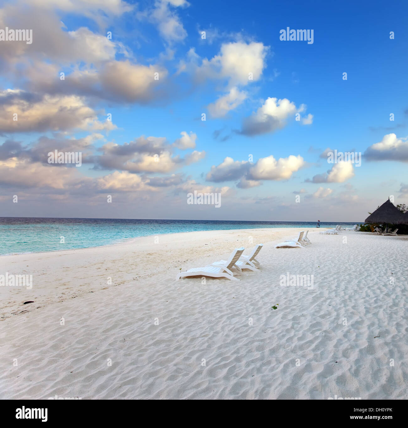 Empty chaise lounge before ocean, sunrise Stock Photo - Alamy