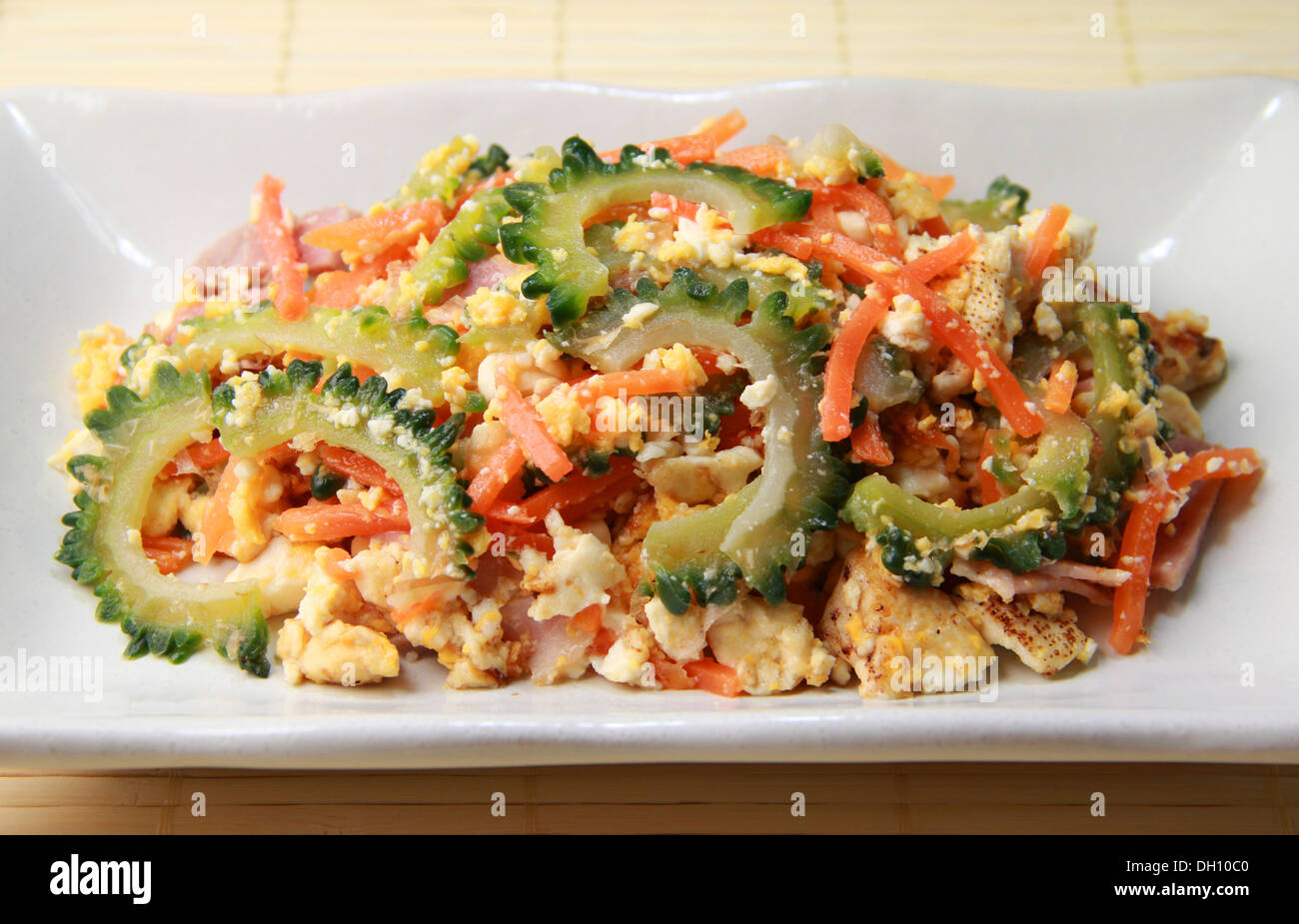 Goya chanpuru (Stir-fried bitter gourd Stock Photo - Alamy
