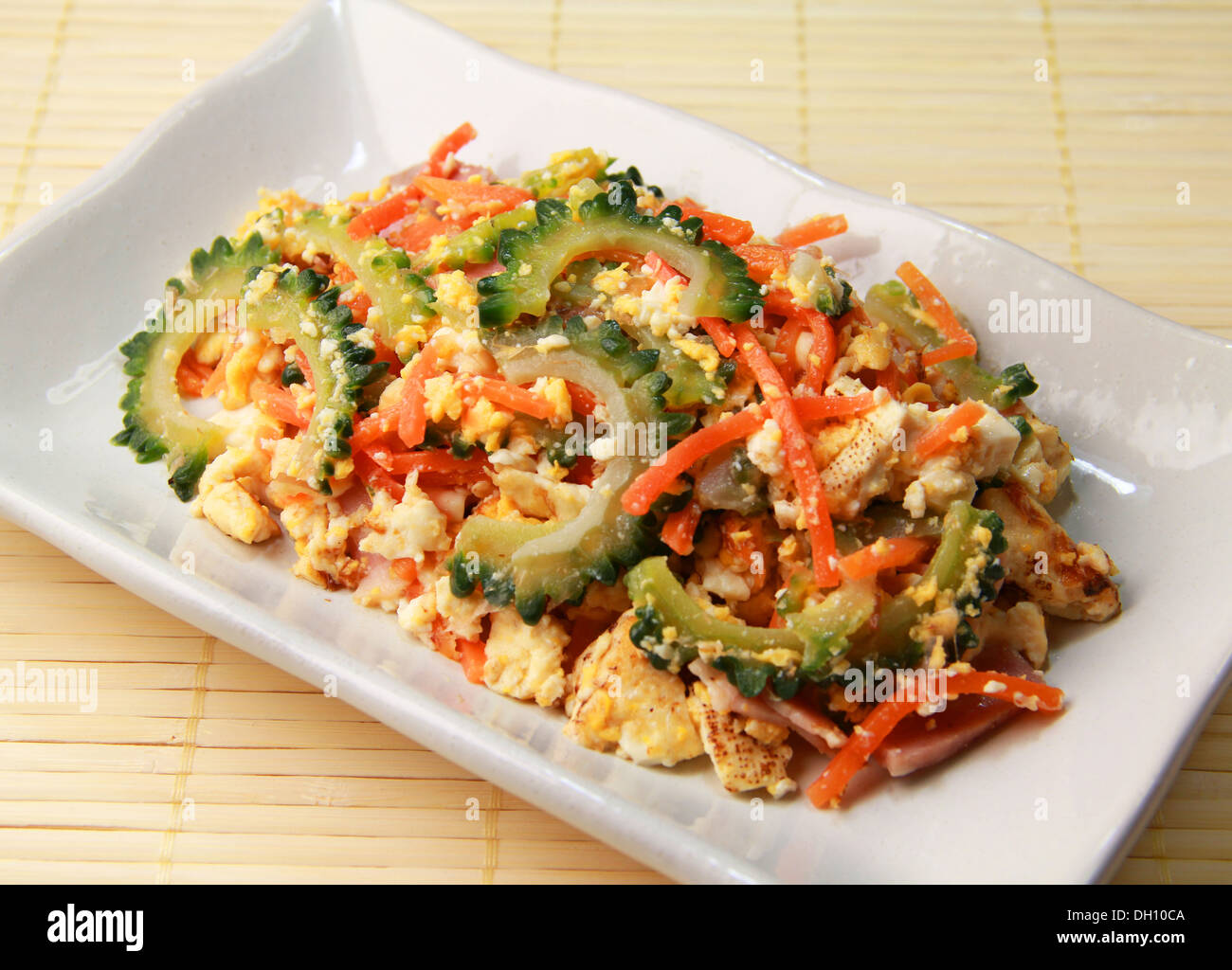 Goya chanpuru (Stir-fried bitter gourd Stock Photo - Alamy