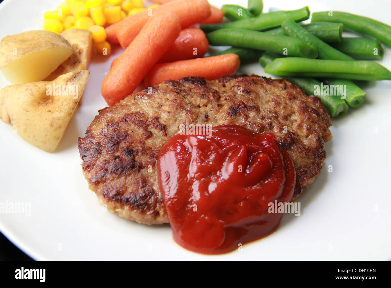 Plate of hamburger steak Stock Photo - Alamy