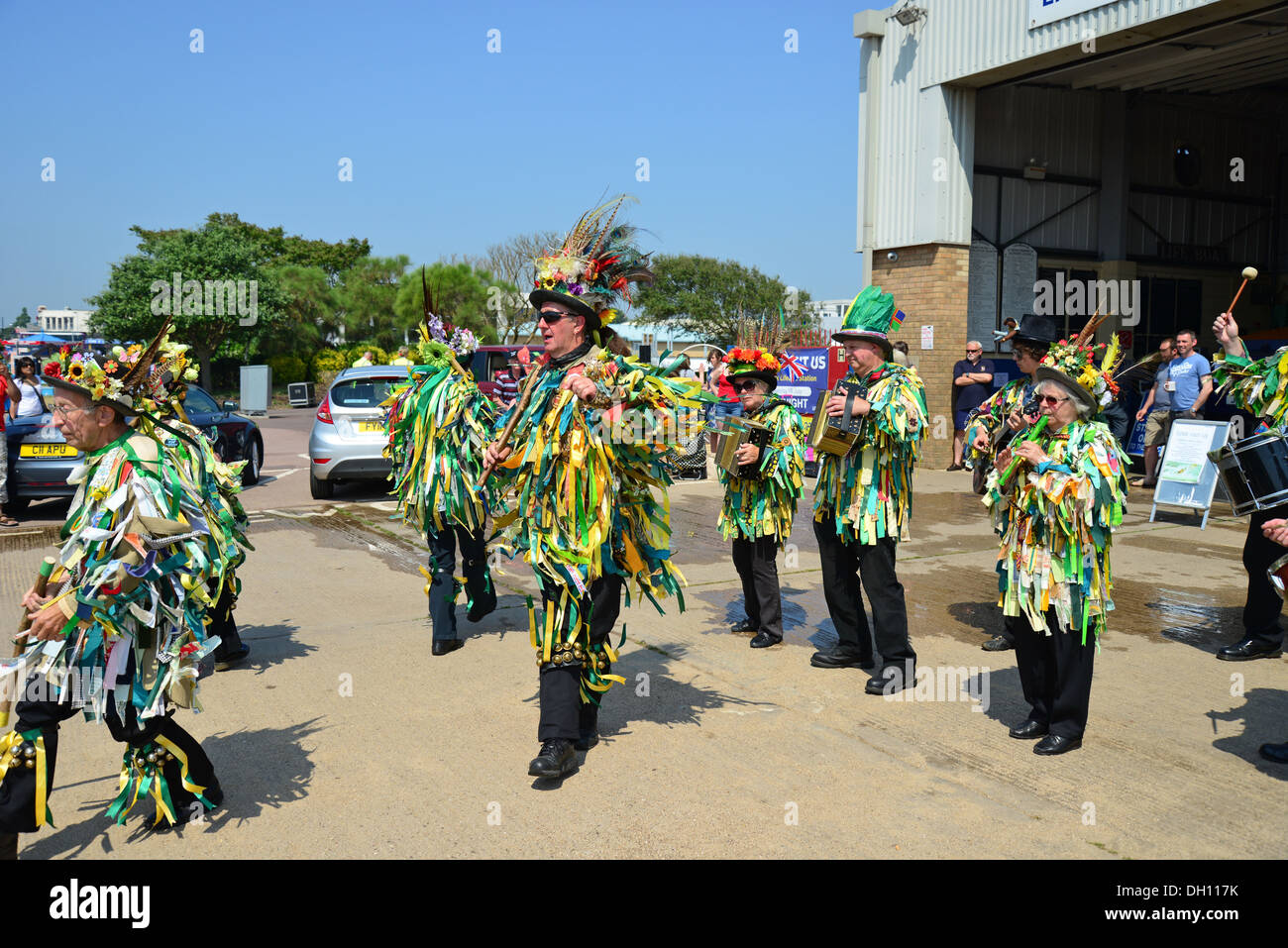 Morris dancing troupe performing on seafront promenade, Skegness ...