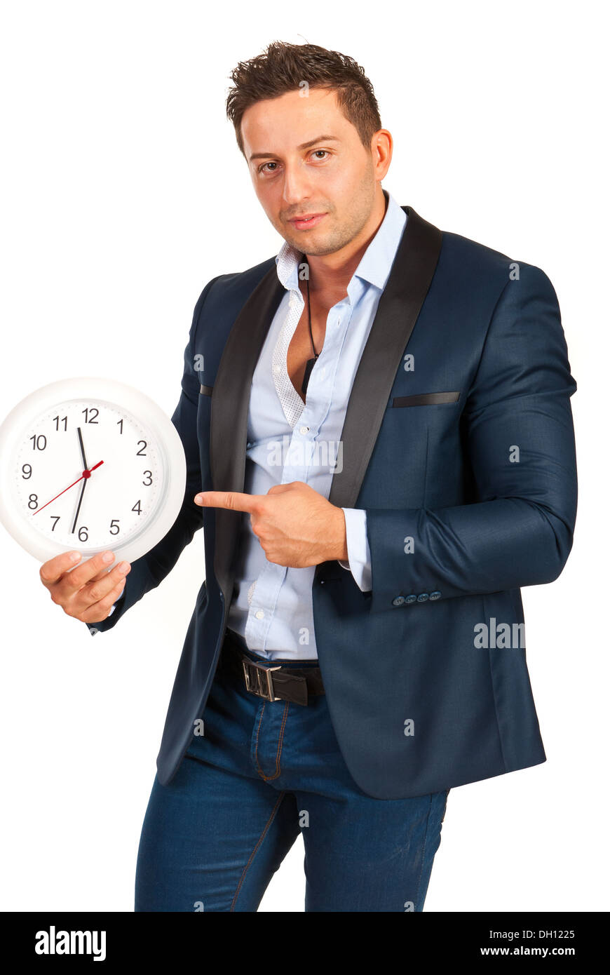 Business man pointing to big clock isolated on white background Stock ...