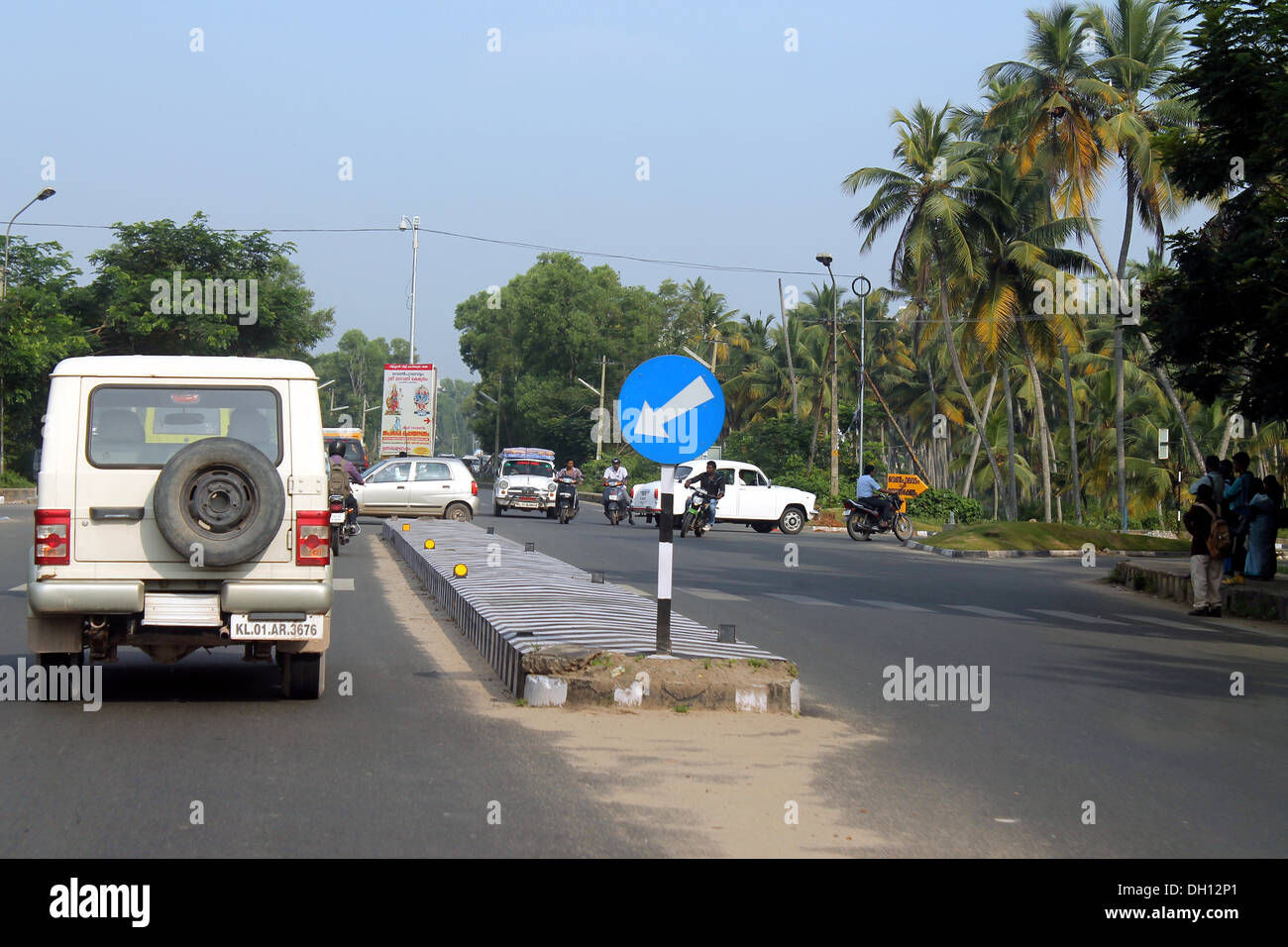 Compulsory keep left traffic sign board in Indian road Stock Photo - Alamy