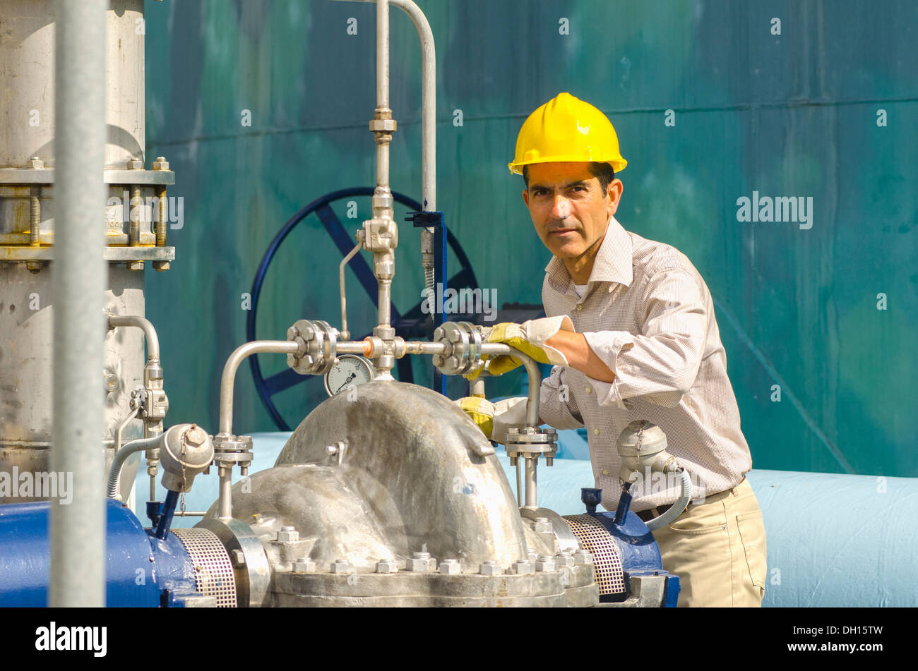 Portrait factory worker examining hi-res stock photography and images ...