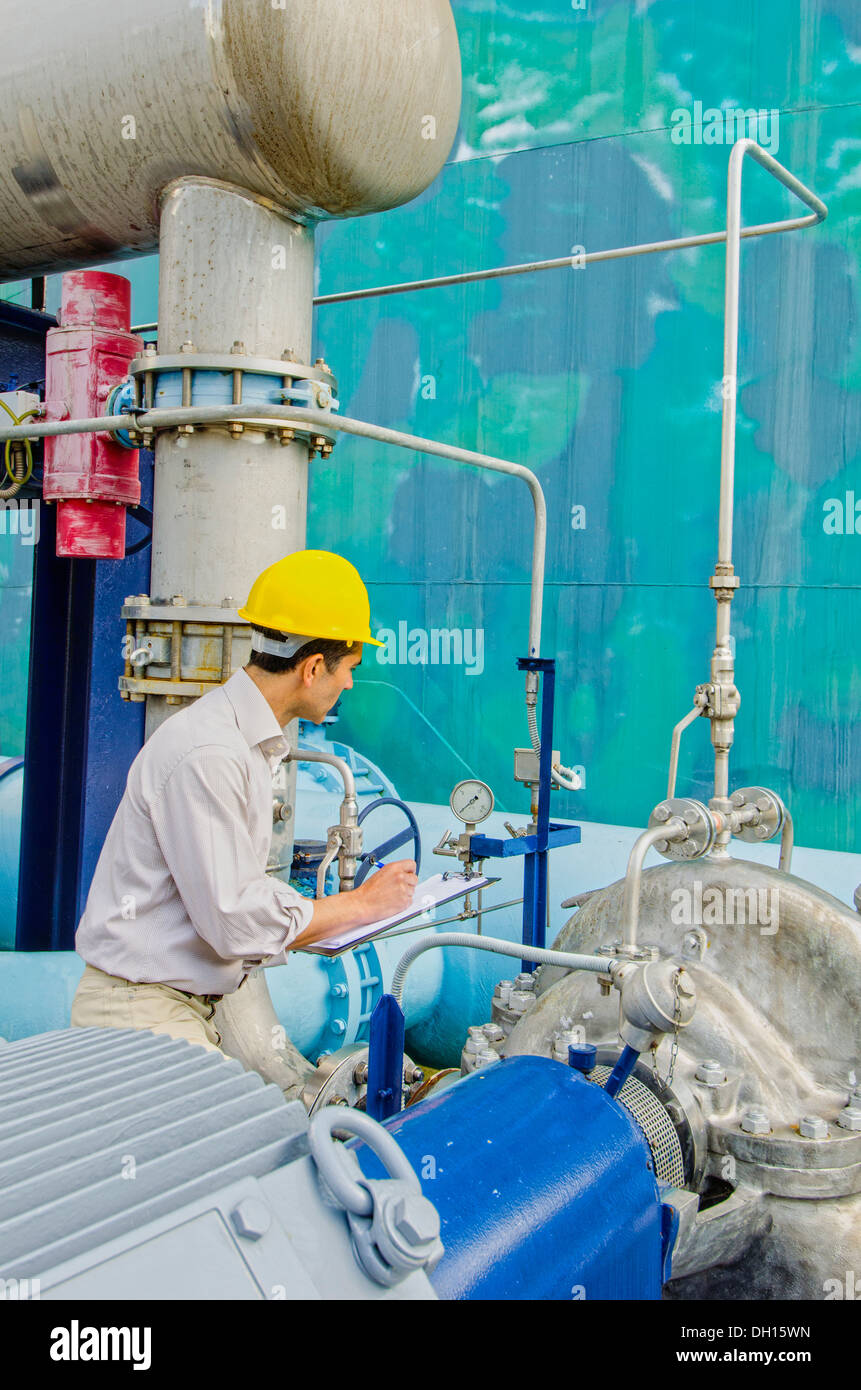 Worker checking hi-res stock photography and images - Alamy