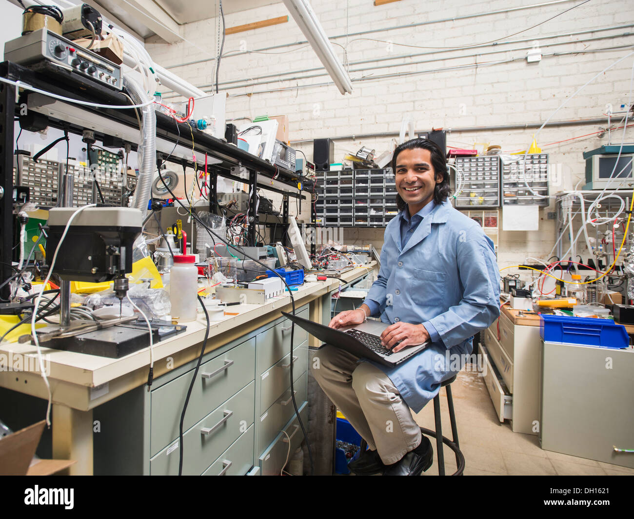 Scientist using laptop in hi-res stock photography and images - Alamy