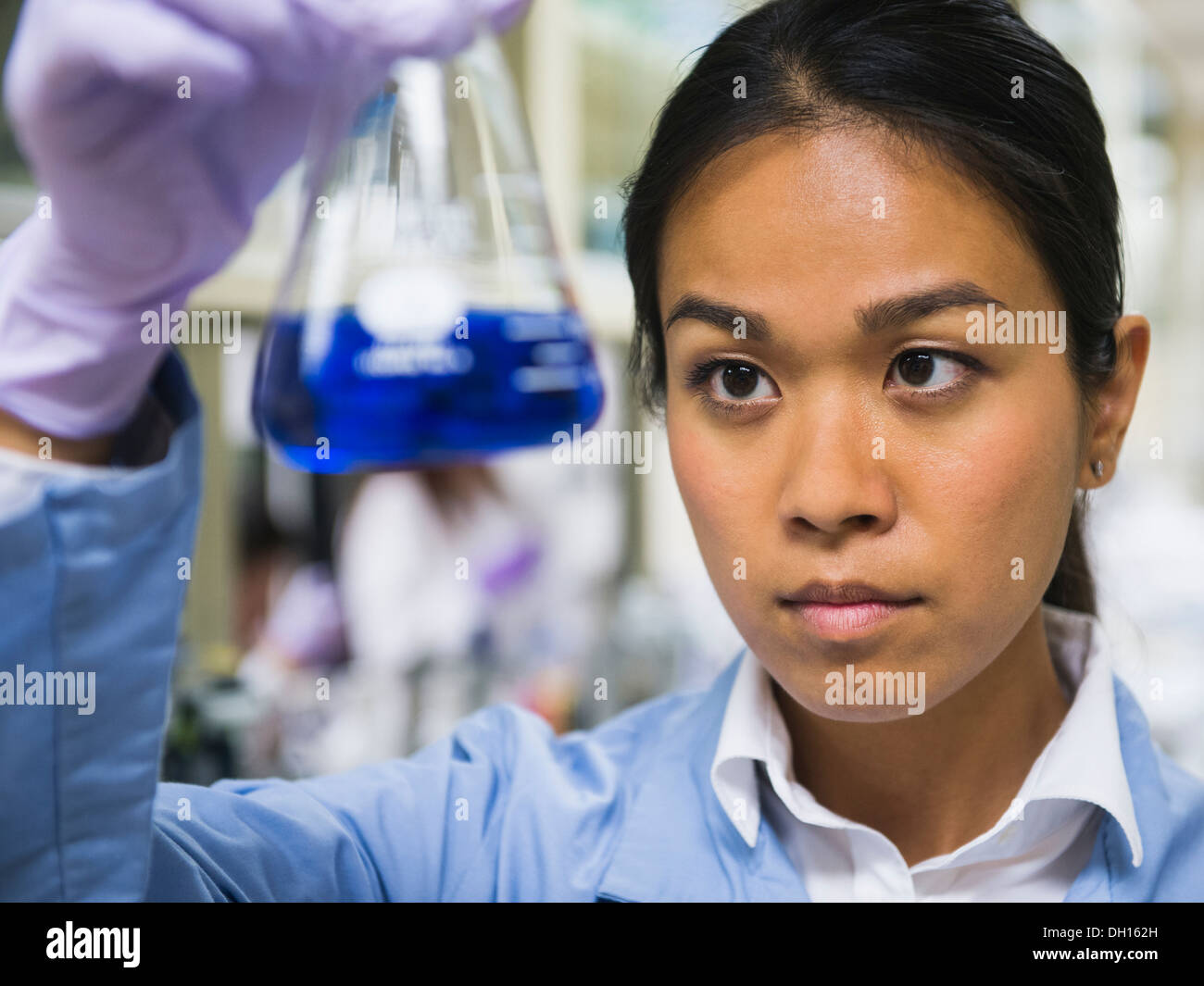 Japanese scientist working in laboratory Stock Photo - Alamy