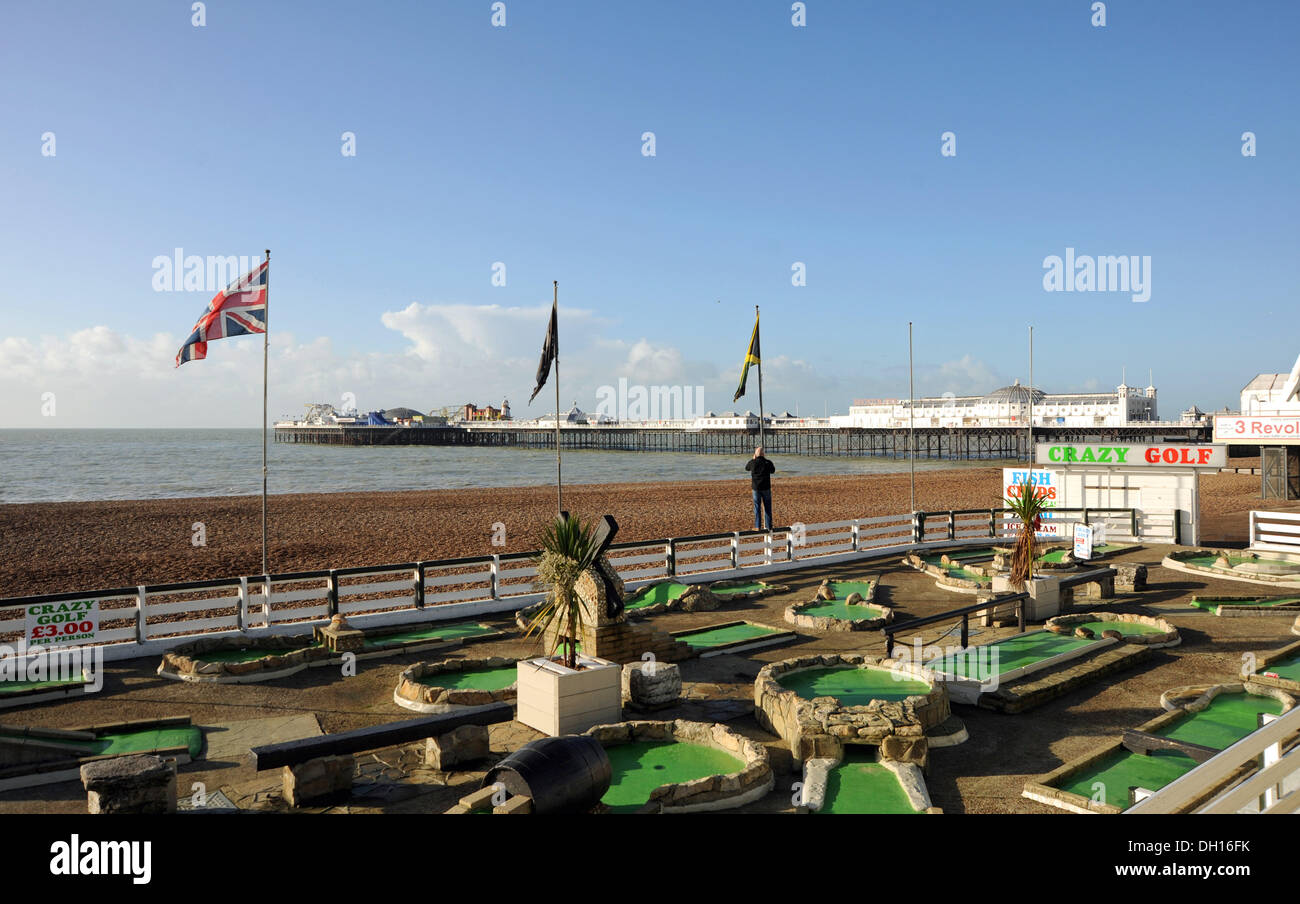 Flags are hoisted in calm weather on Brighton beach this morning after ...