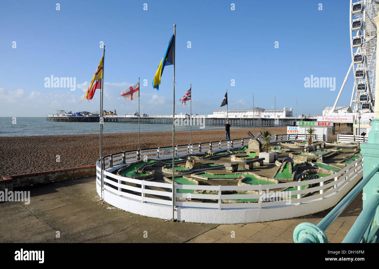 Flags are hoisted in calm weather on Brighton beach this morning after ...