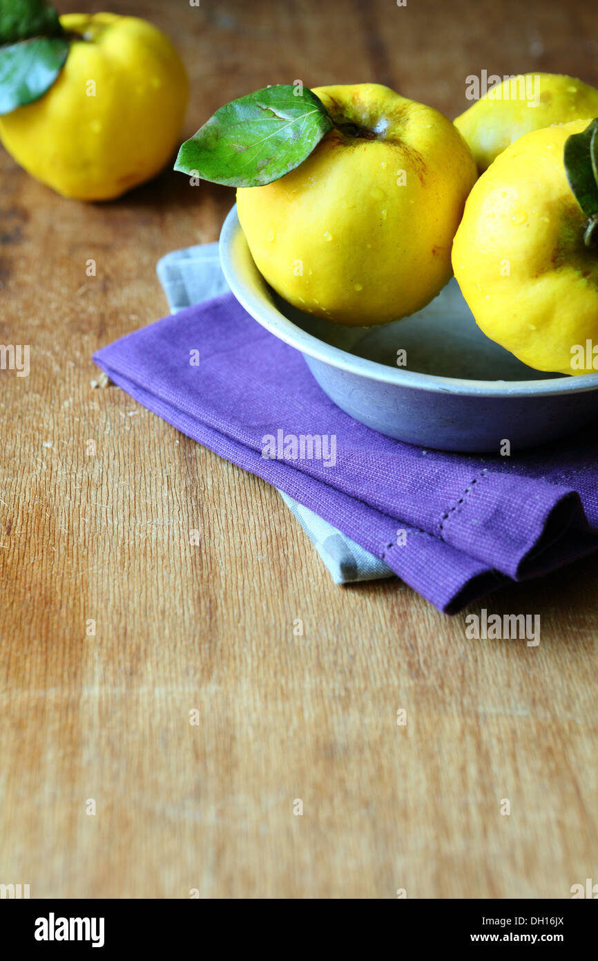 fresh ripe quince in an old bowl, food close up Stock Photo - Alamy