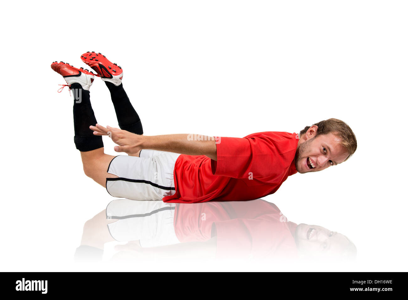 Football player celebrating a goal isolated in white Stock Photo - Alamy
