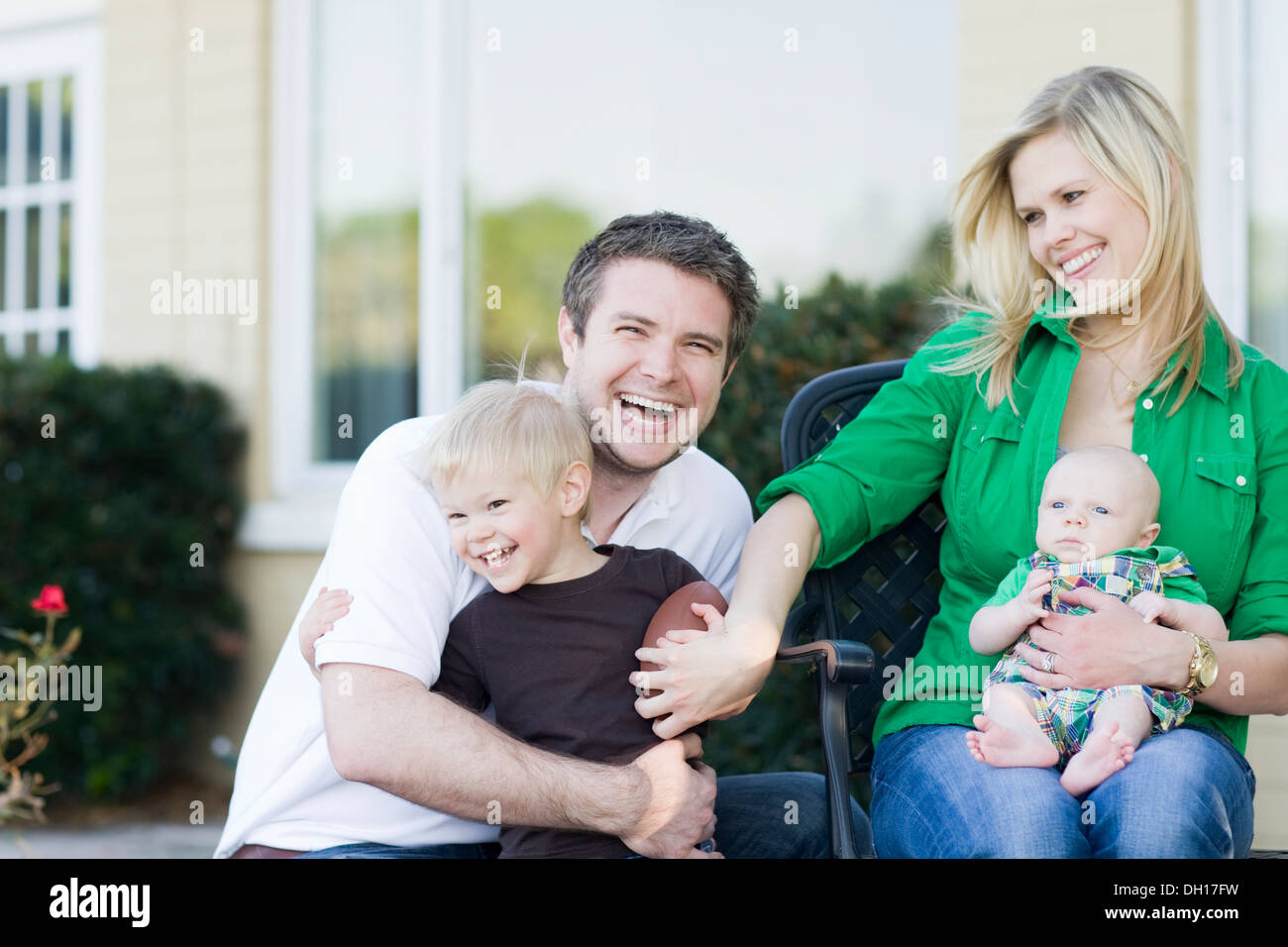 Family laughing relaxing on hi-res stock photography and images - Alamy