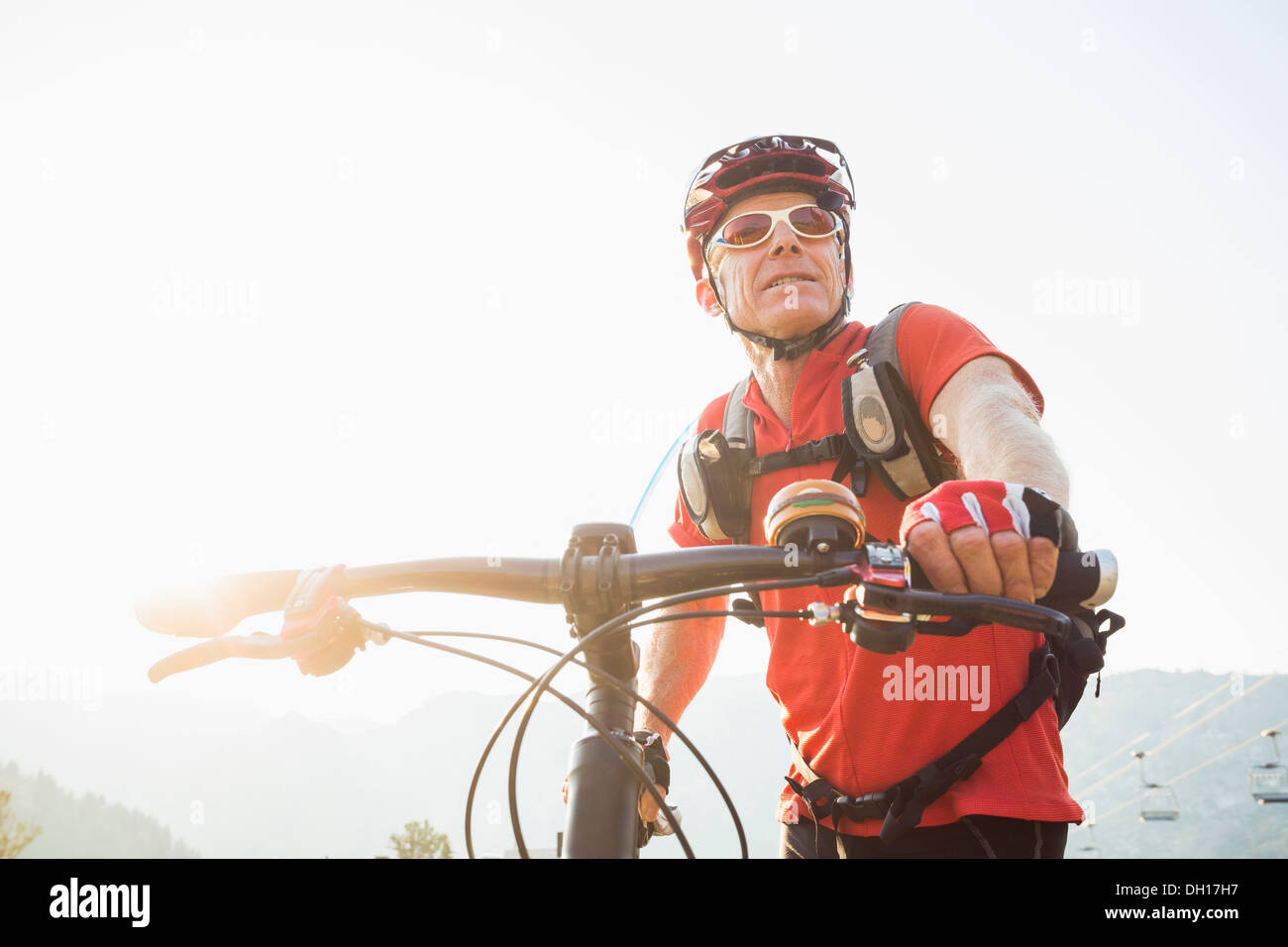 Man pushing his bicycle hi-res stock photography and images - Alamy