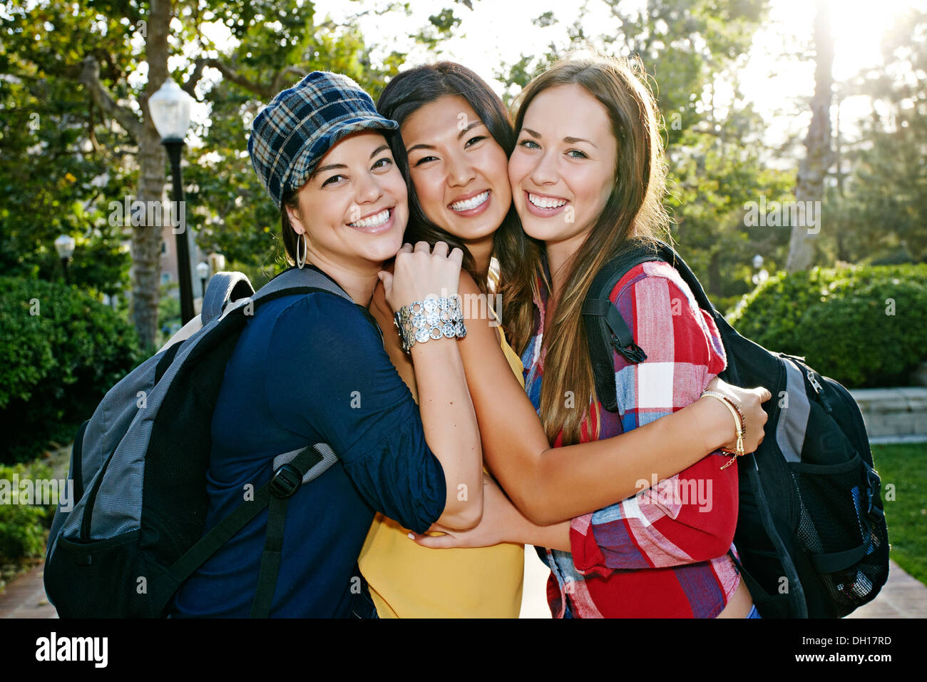 Students smiling together on campus Stock Photo - Alamy