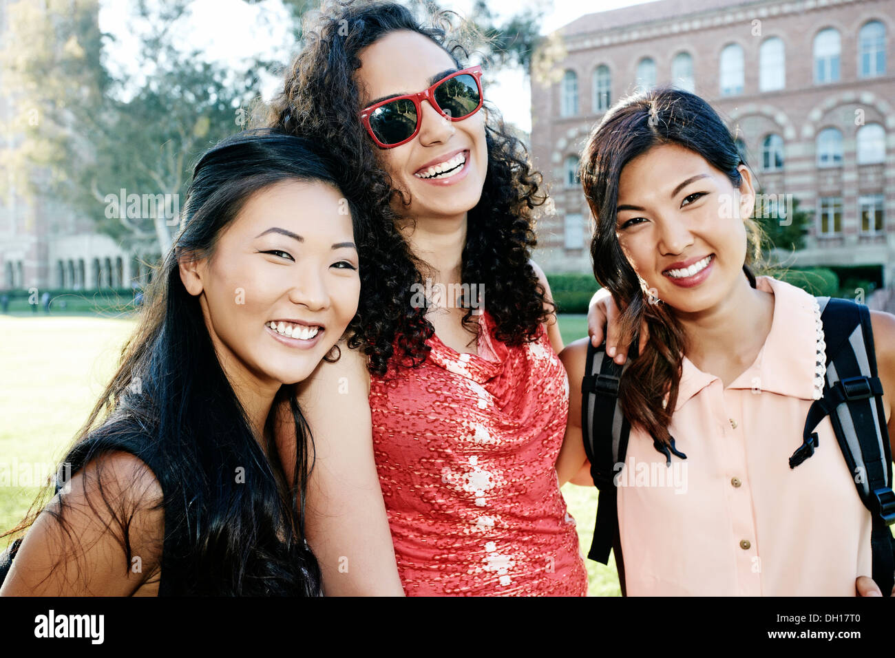 Students smiling on campus Stock Photo - Alamy