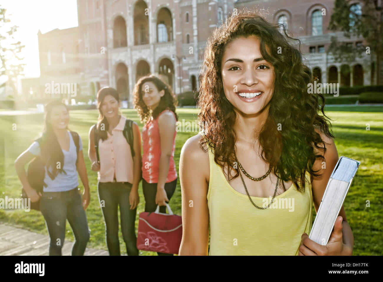Student smiling on campus Stock Photo - Alamy