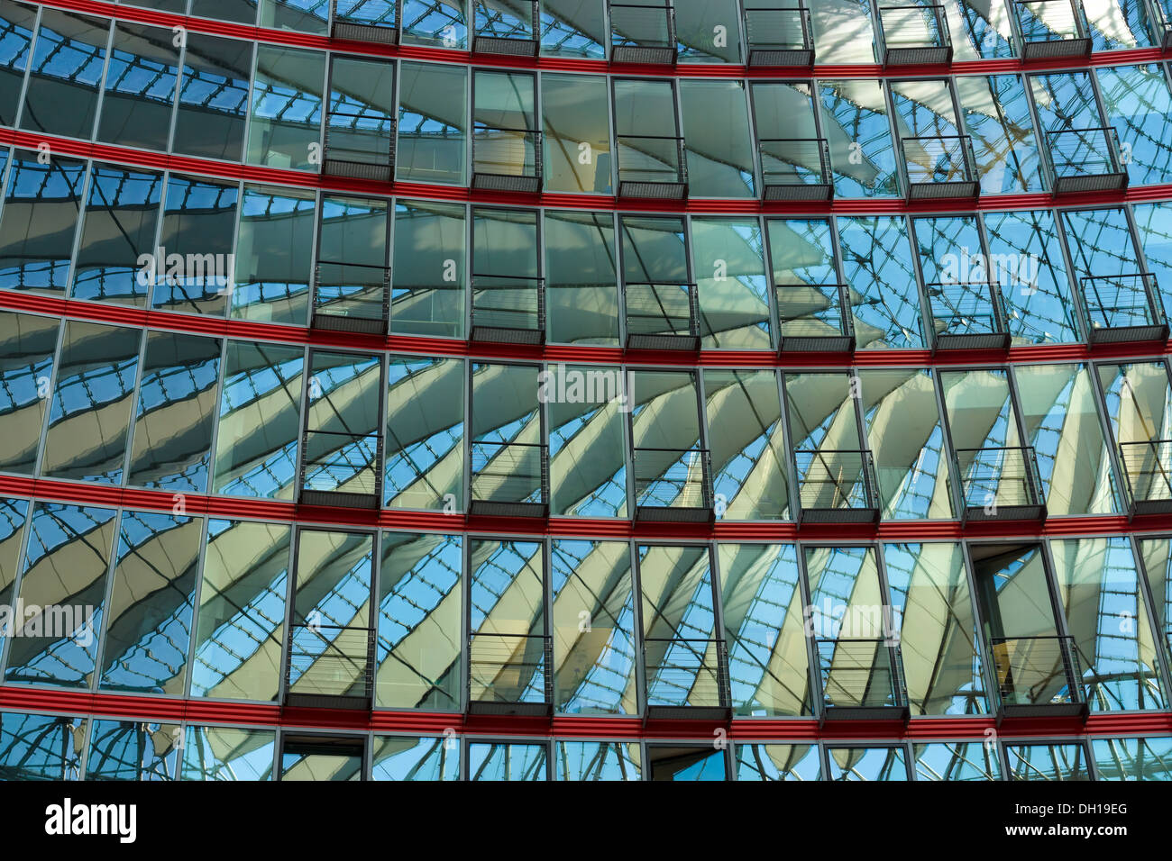 The reflections in the windows of a modern home Stock Photo - Alamy