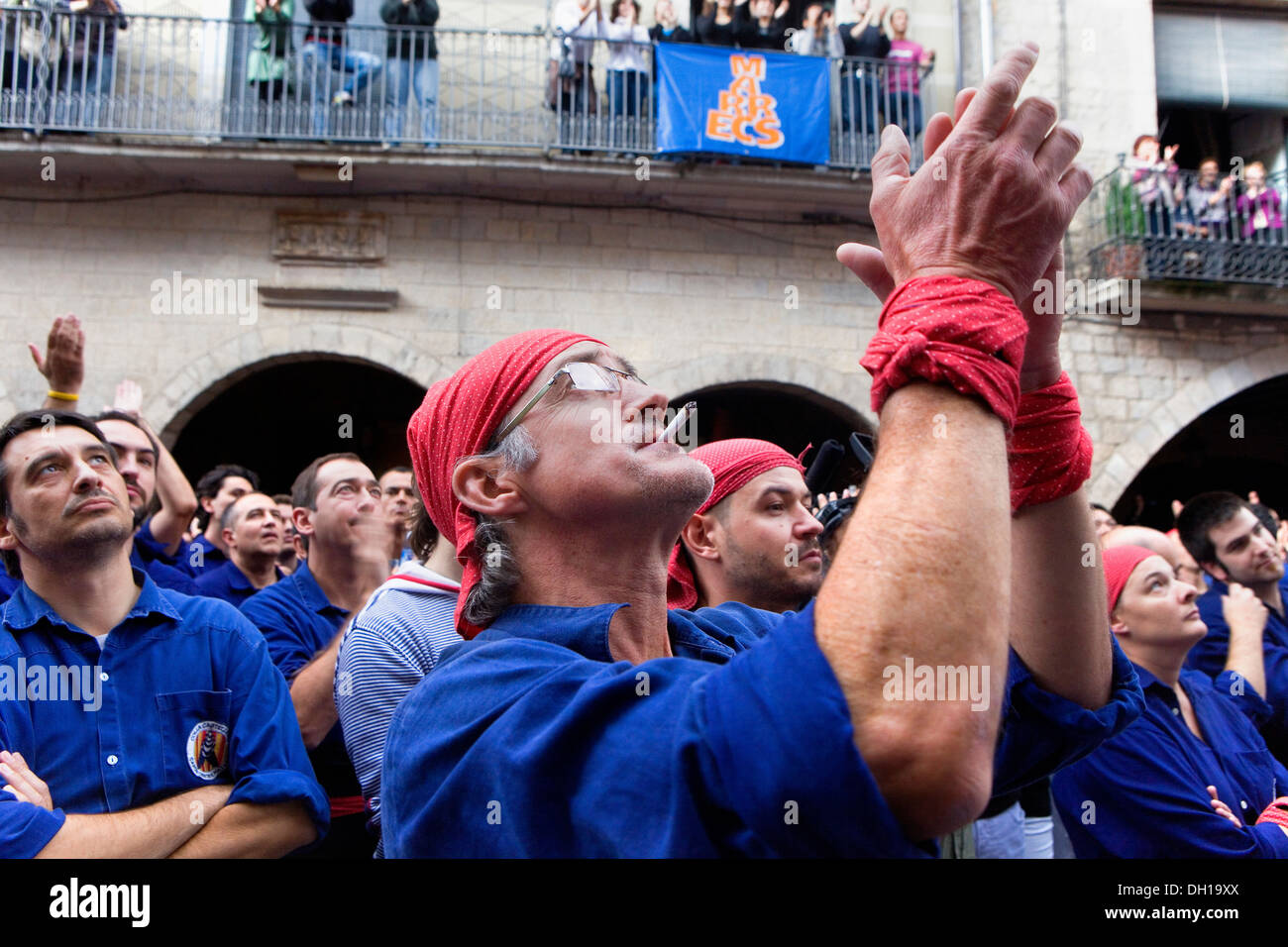 Casteller of Capgrossos de Mataró encouraging their peers .'Castellers ...