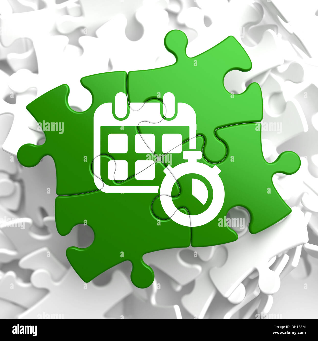 Calendar with Timer Icon on Green Puzzle Stock Photo - Alamy