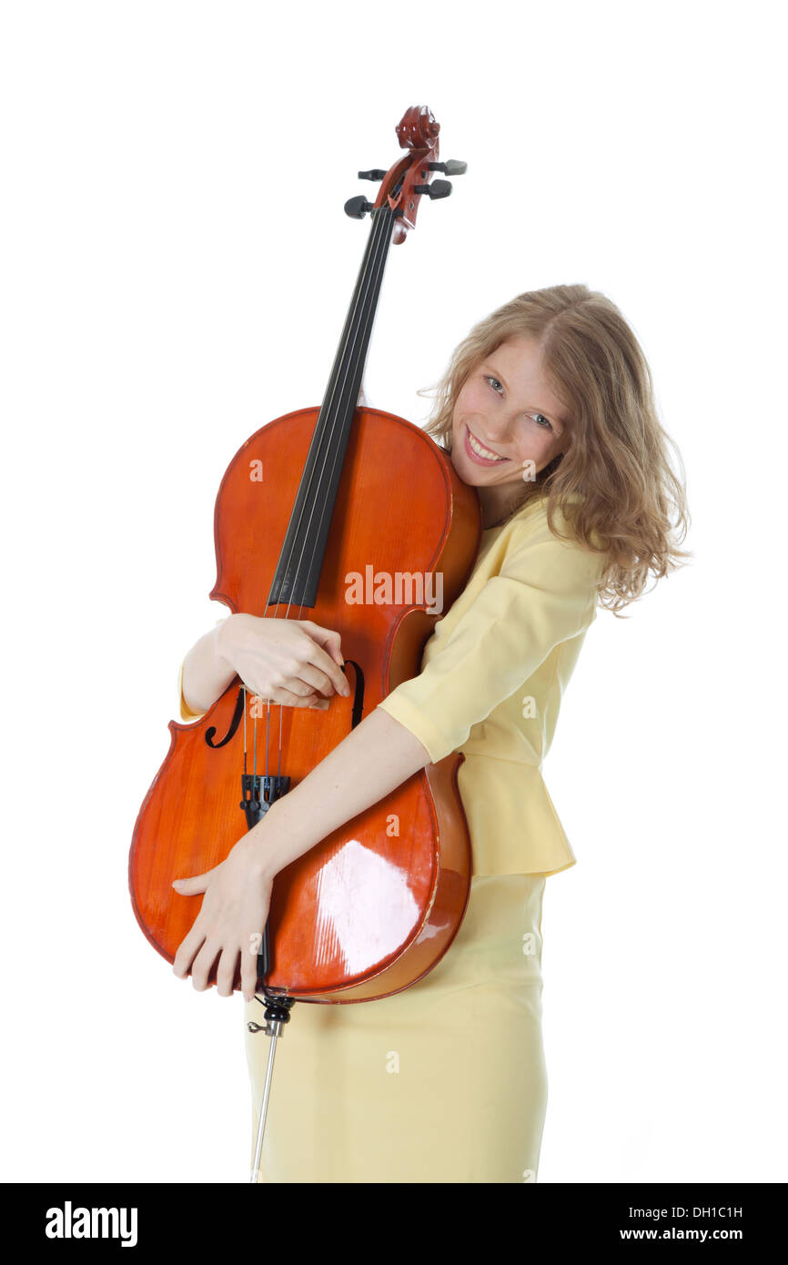 young woman holding cello in her arms and white background Stock Photo ...