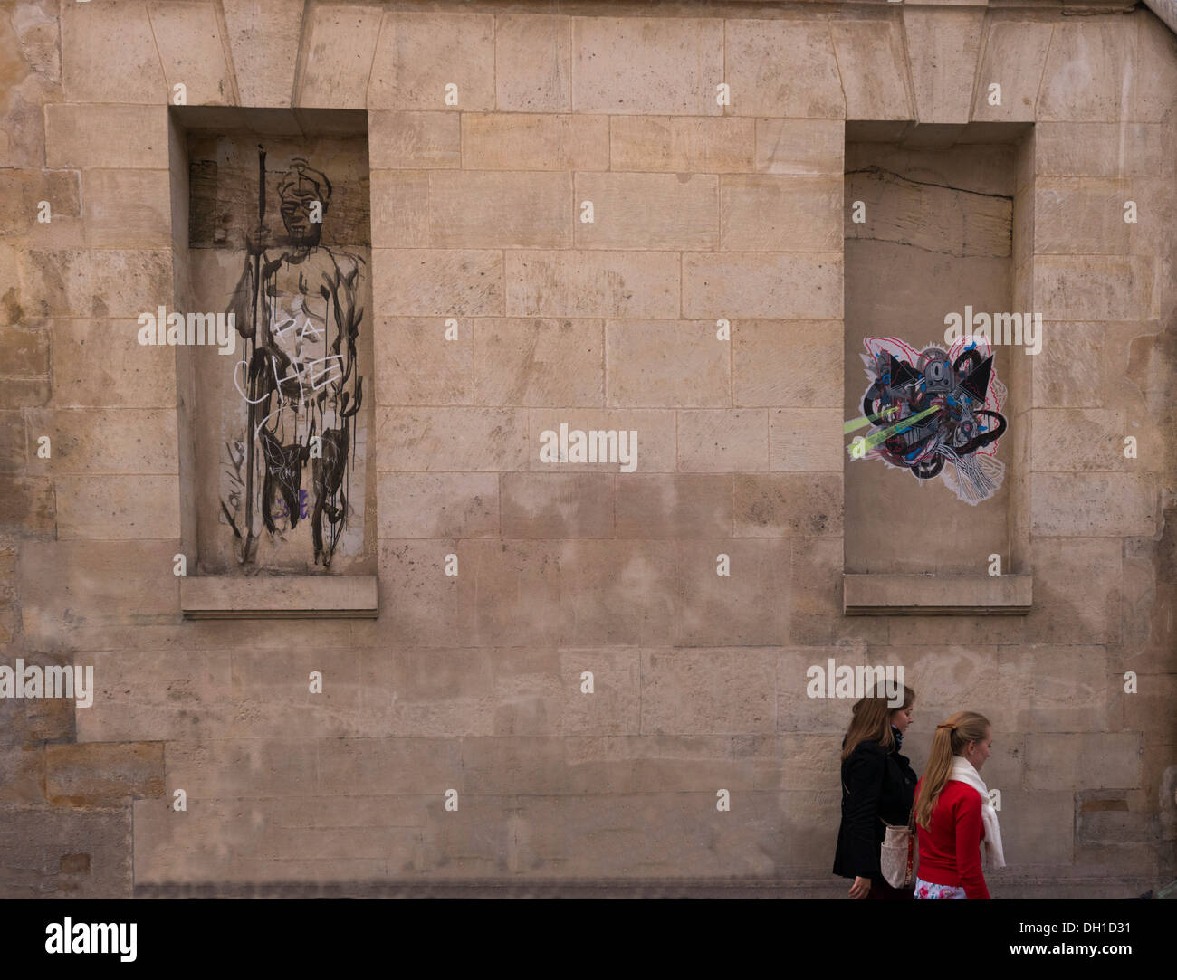 Drawing graffiti in Paris, France Stock Photo - Alamy