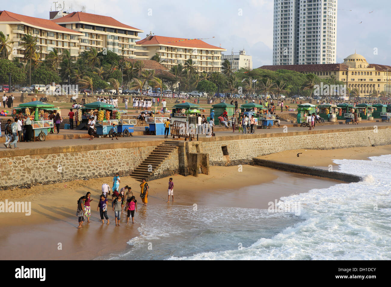 People enjoying a sunny afternoon on Galle Face beach in Colombo, Sri ...