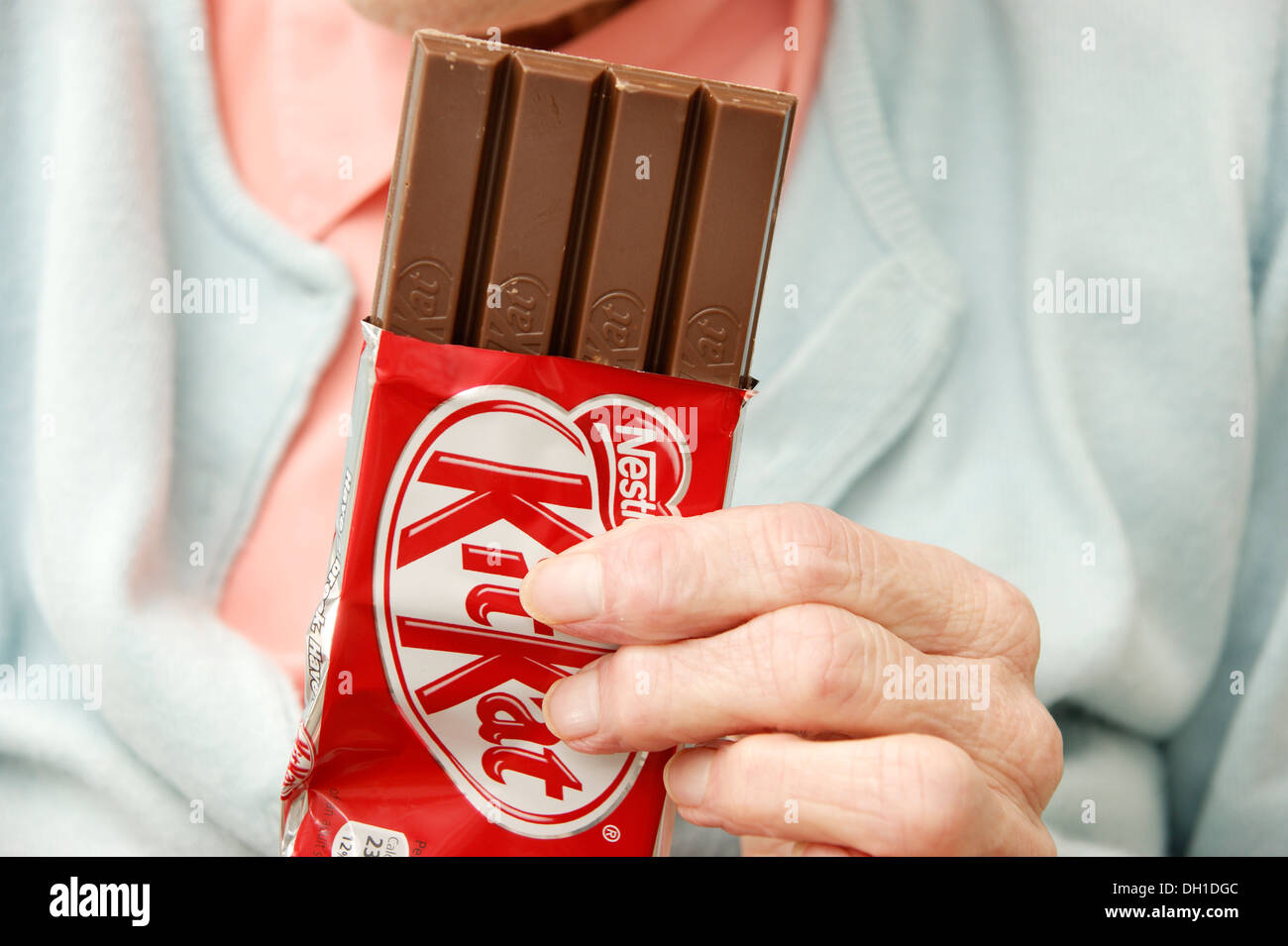 Woman eating kit kat hi-res stock photography and images - Alamy