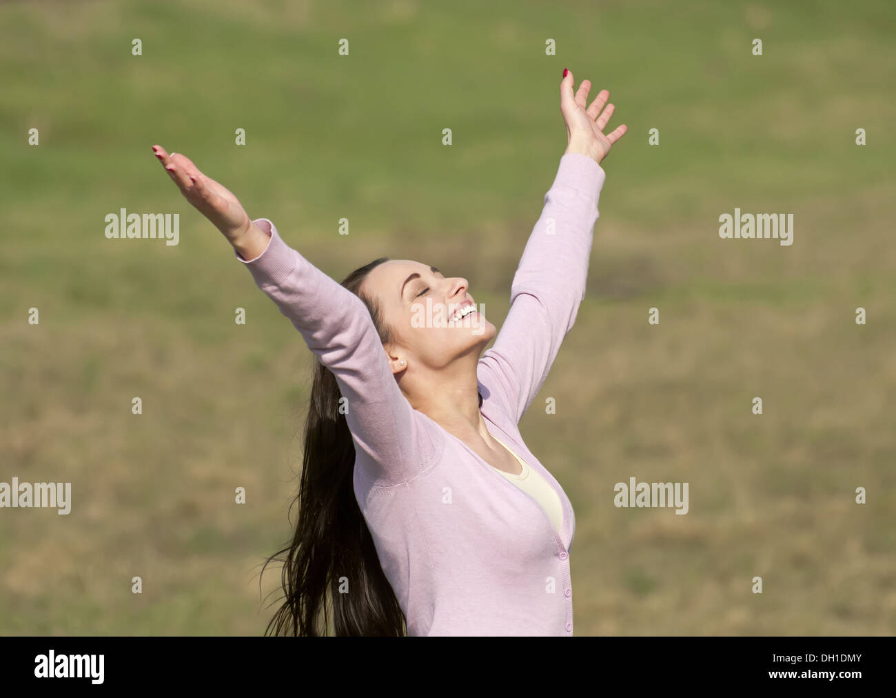Smiling spreading arms hi-res stock photography and images - Alamy