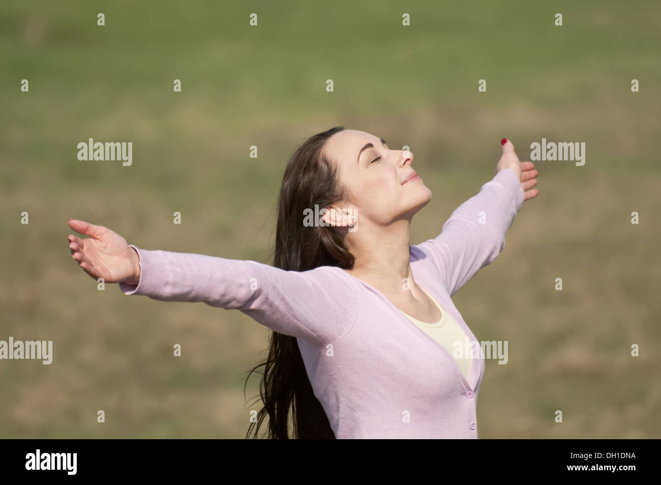 young woman feeling free Stock Photo - Alamy