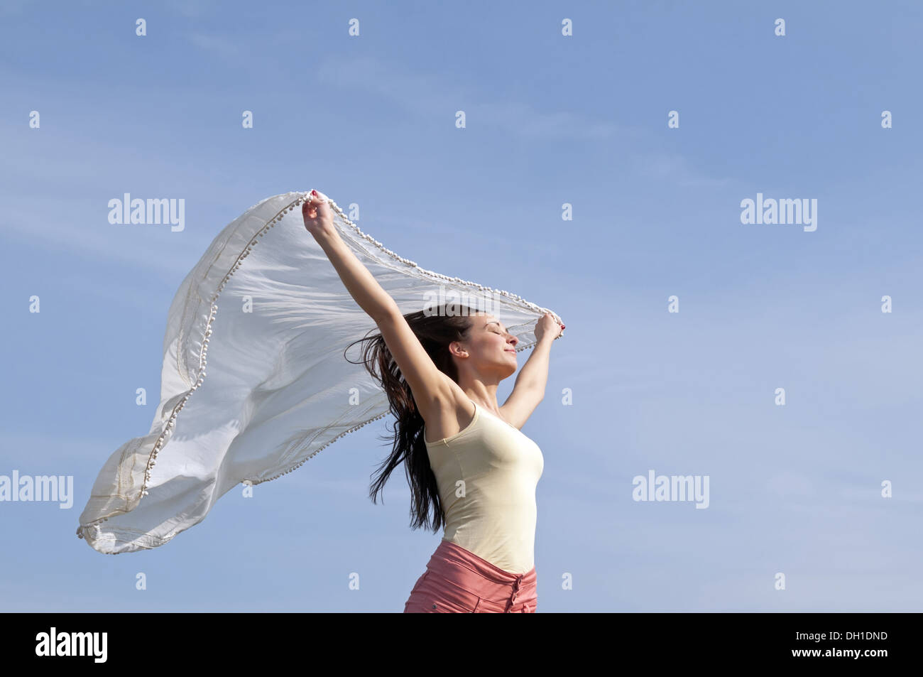 woman with flying scarf Stock Photo - Alamy