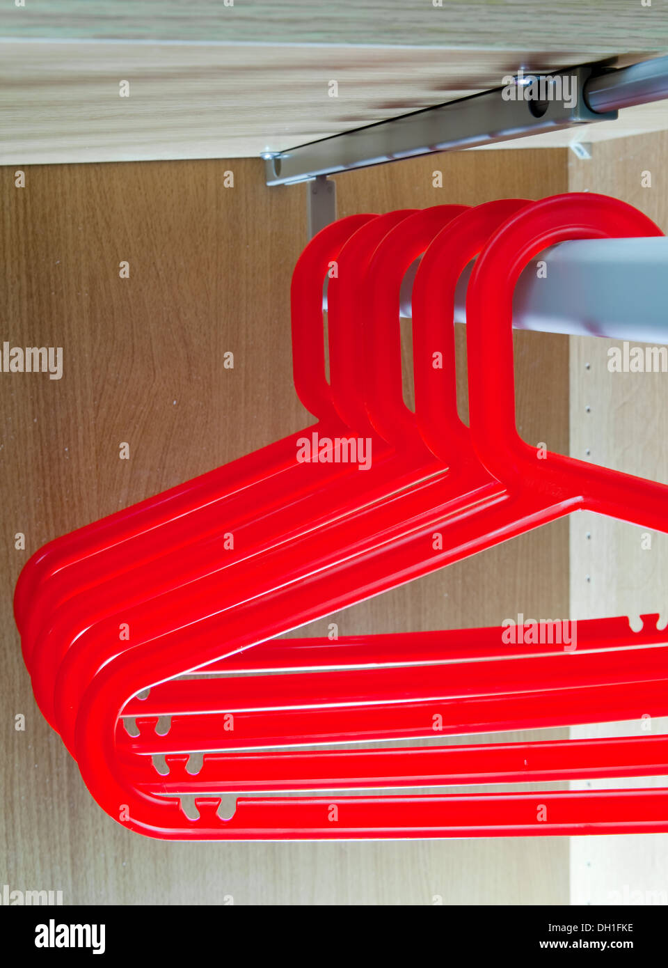 Hanger in a wardrobe Stock Photo - Alamy