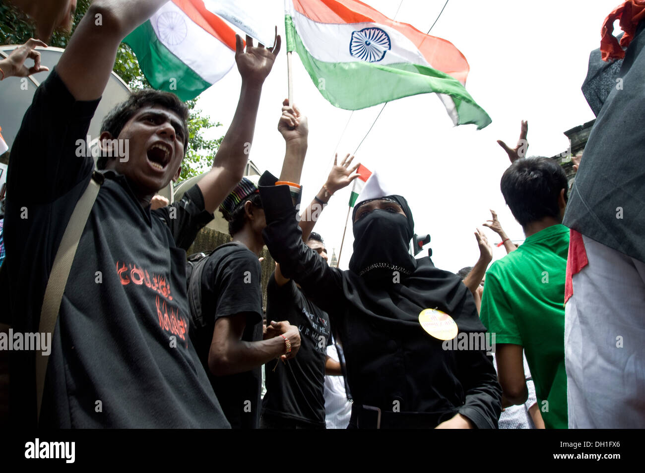 people shouting waving indian flags young people agitation ...