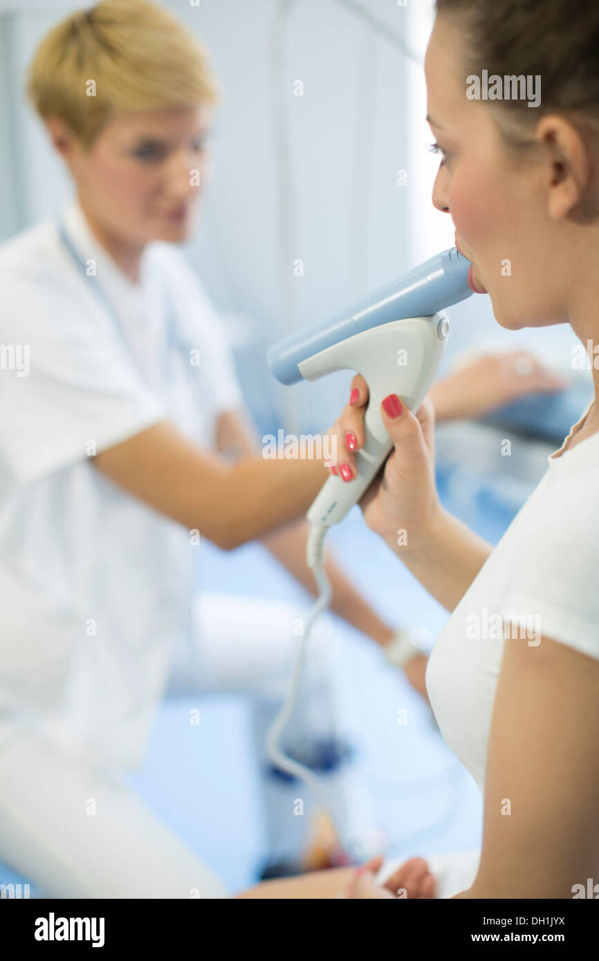 Female patient undergoing lung funtion test, Munich, Bavaria, Germany ...