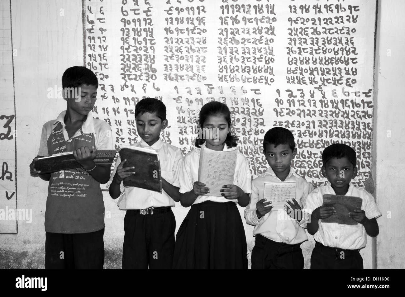 Children learning math lessons in rural classroom , varanasi , uttar ...