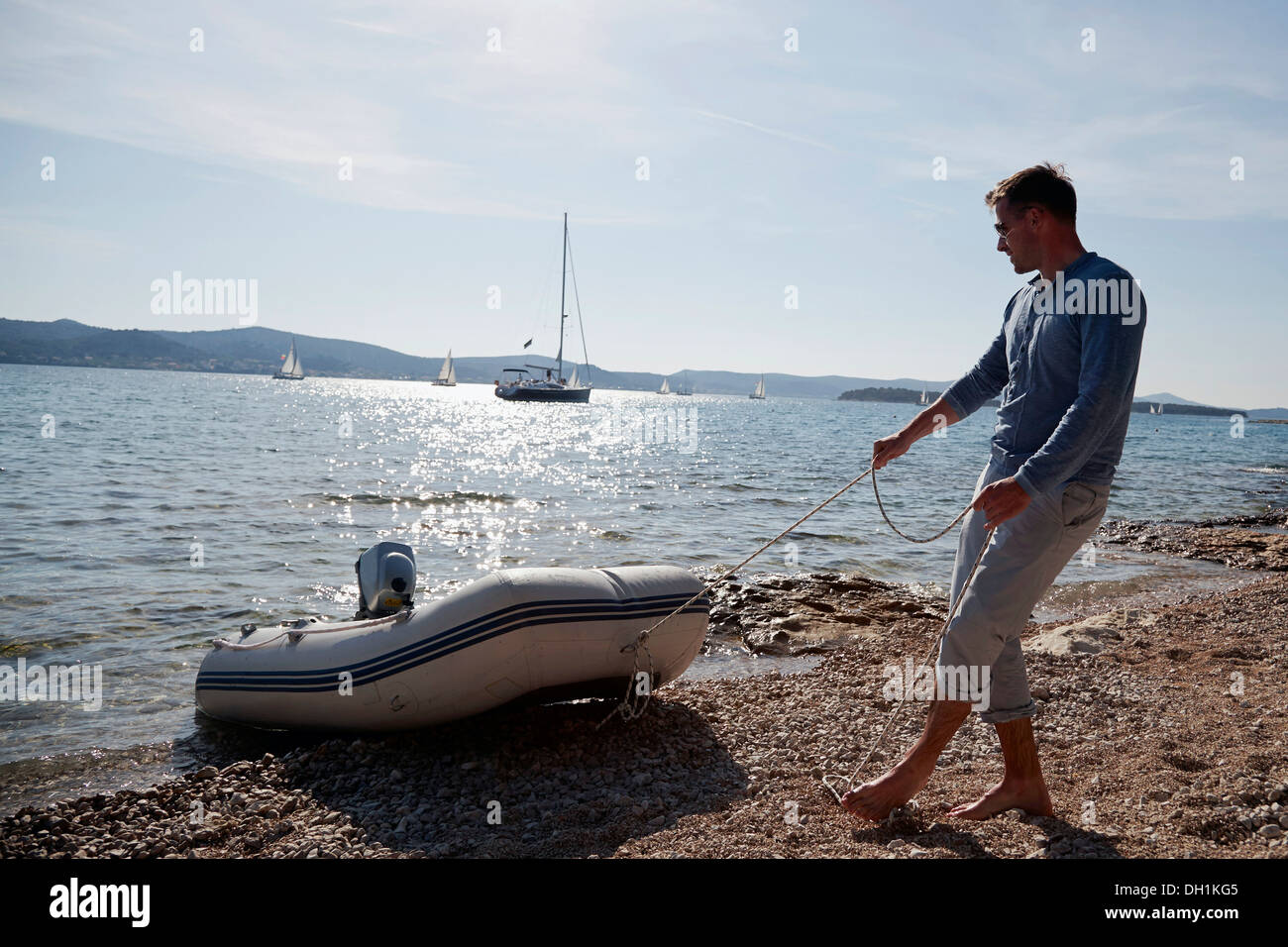 Inflatable dinghy beach hi-res stock photography and images - Alamy