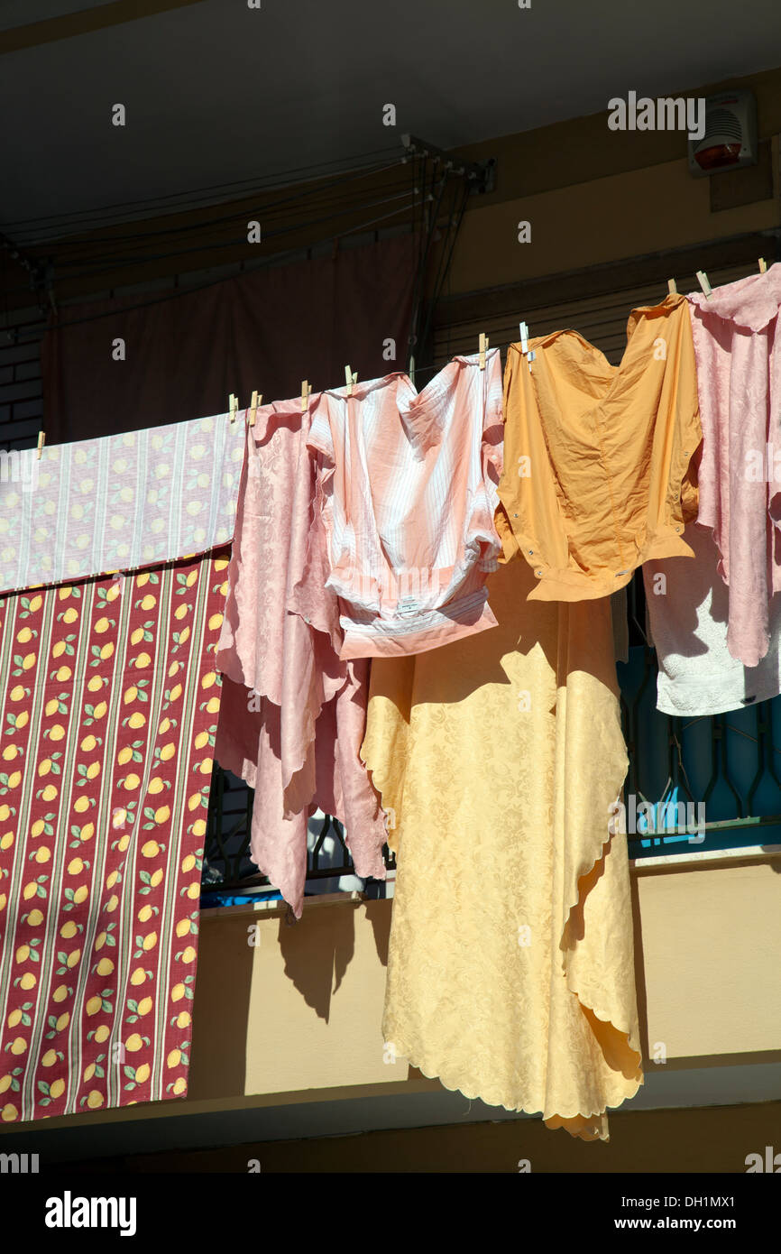 Laundry hanging out of window hi-res stock photography and images - Alamy